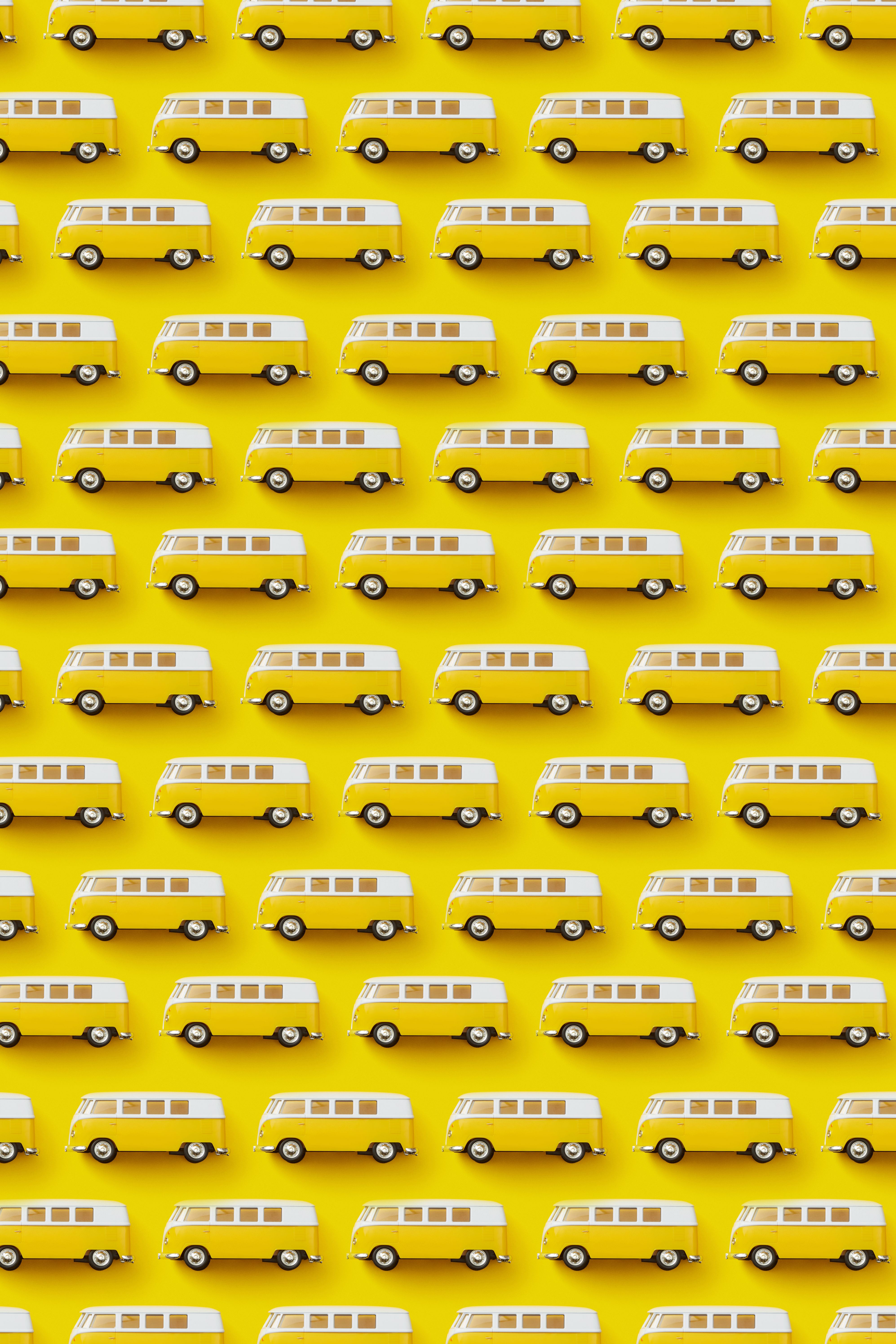 Buses on Yellow Background · Free Stock Photo