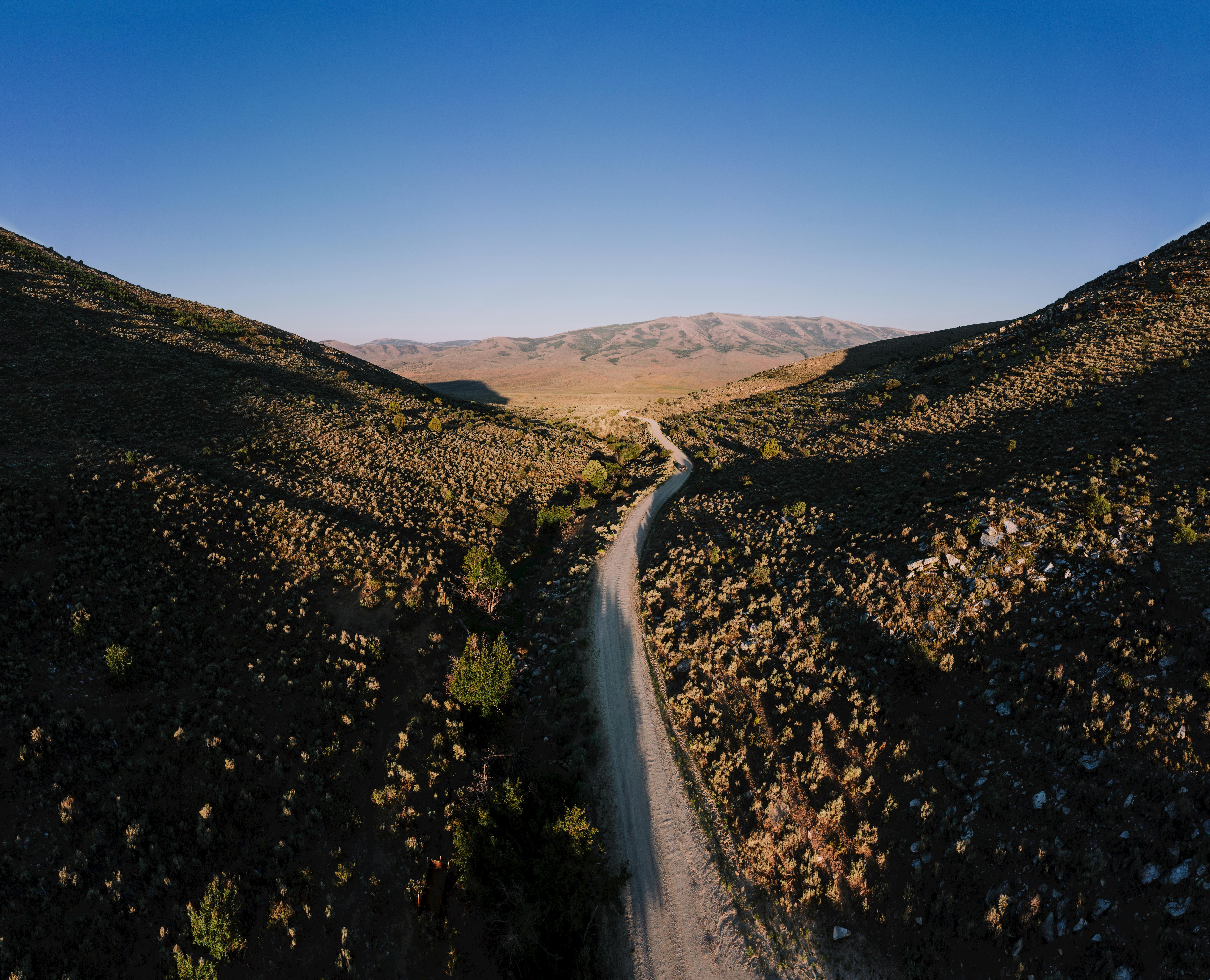 Road in Between Mountains · Free Stock Photo