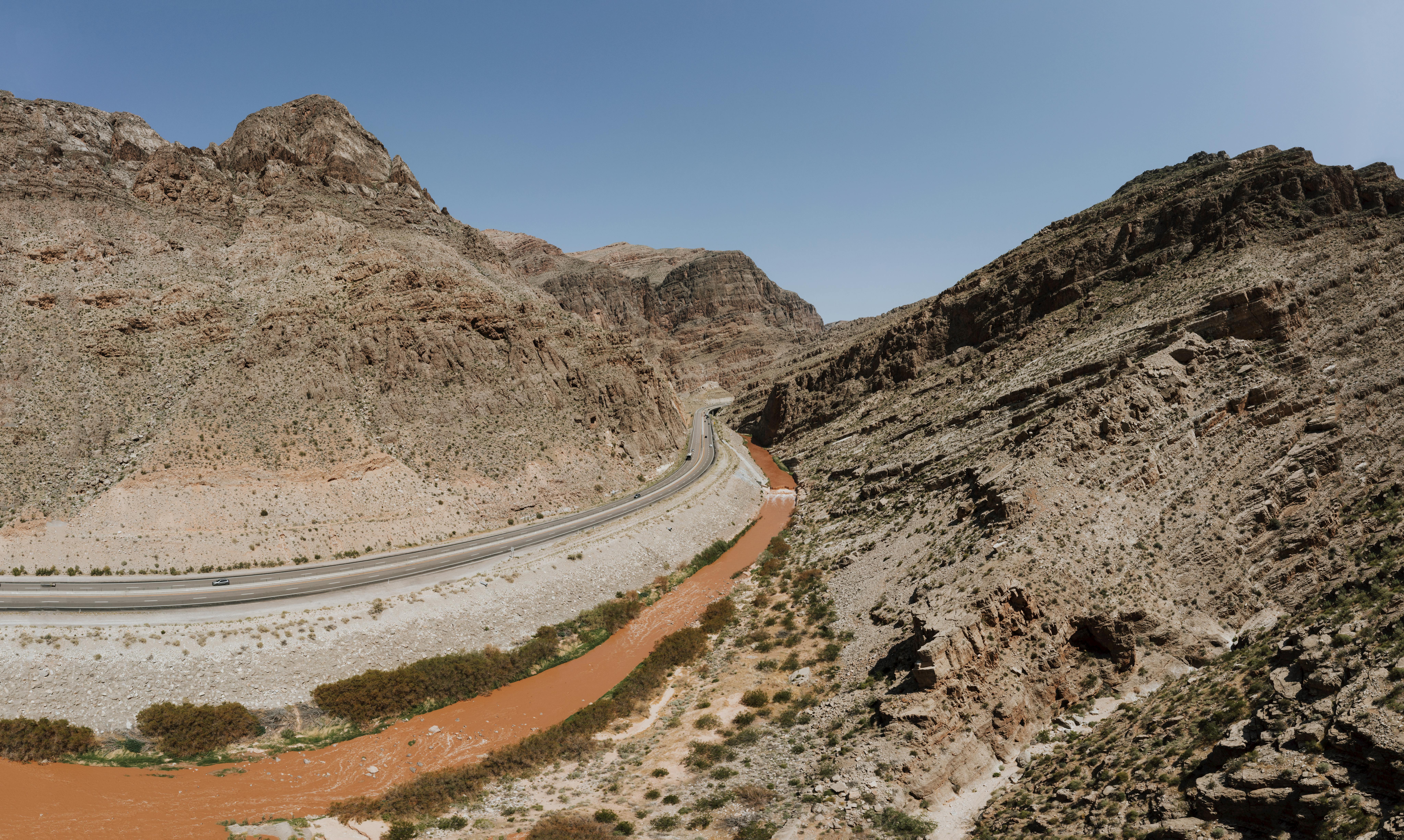 Gray Asphalt Road Between Rock Mountains · Free Stock Photo