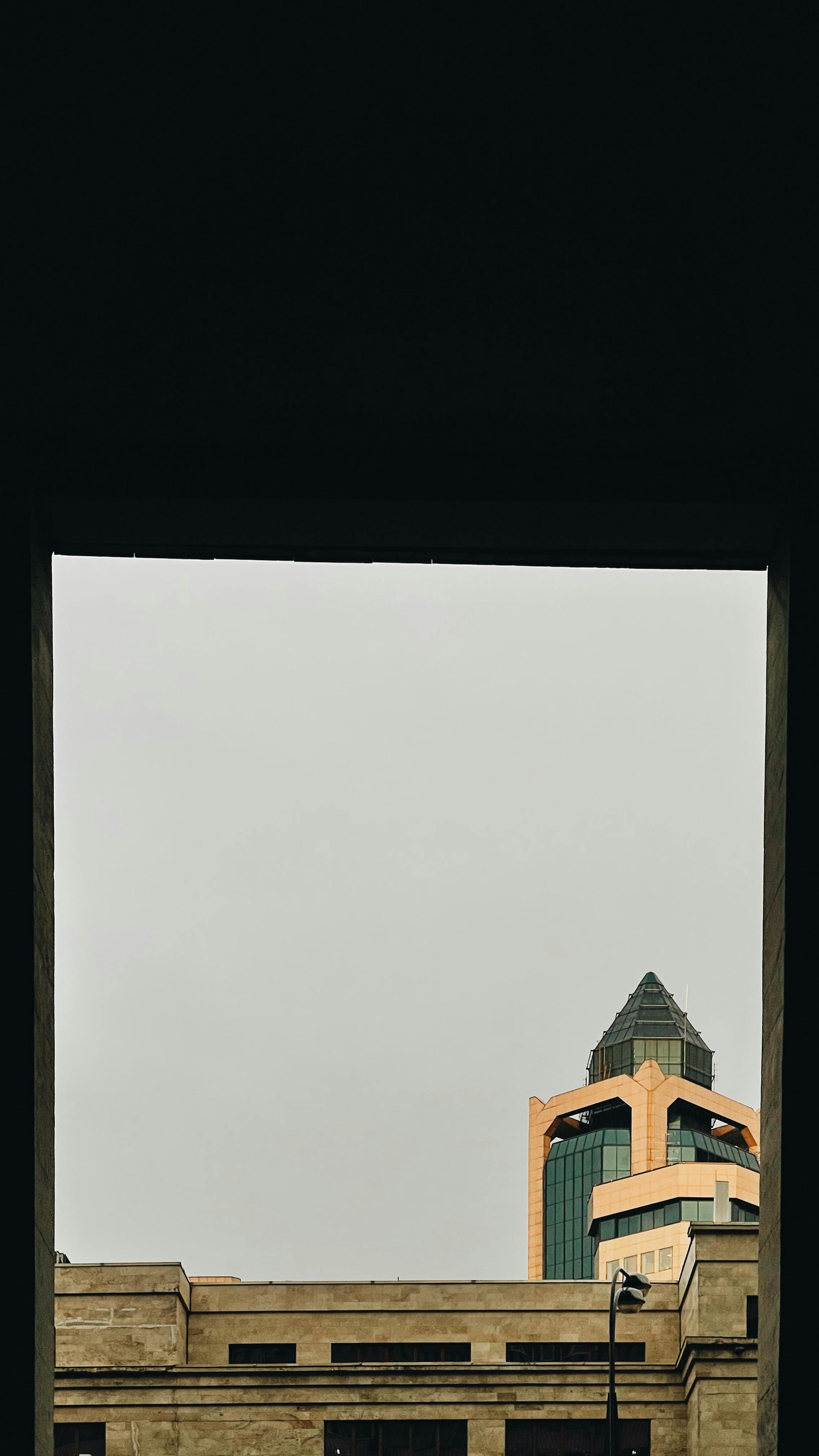 View of a Building from a Window · Free Stock Photo