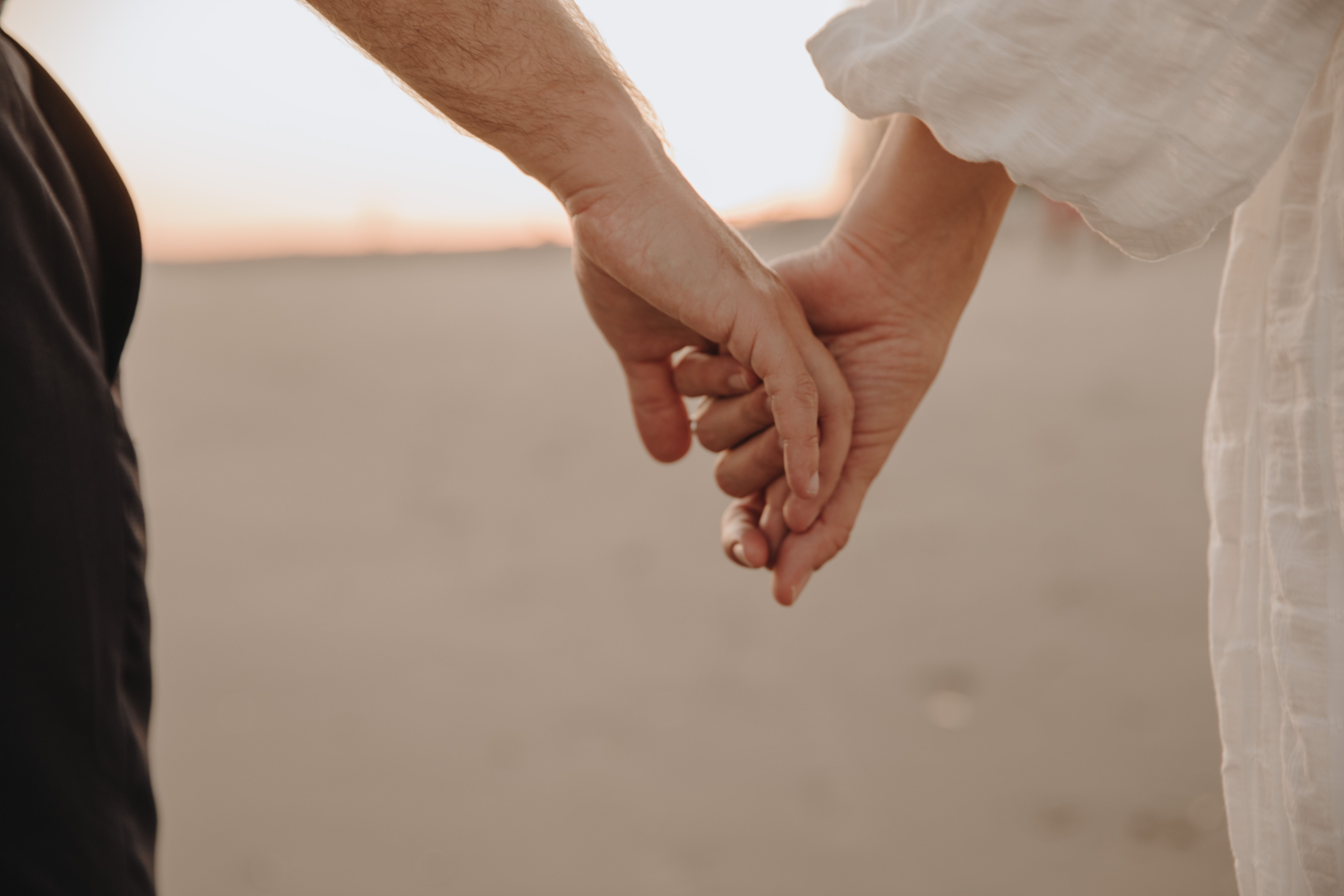 A Couple Holding Hands · Free Stock Photo