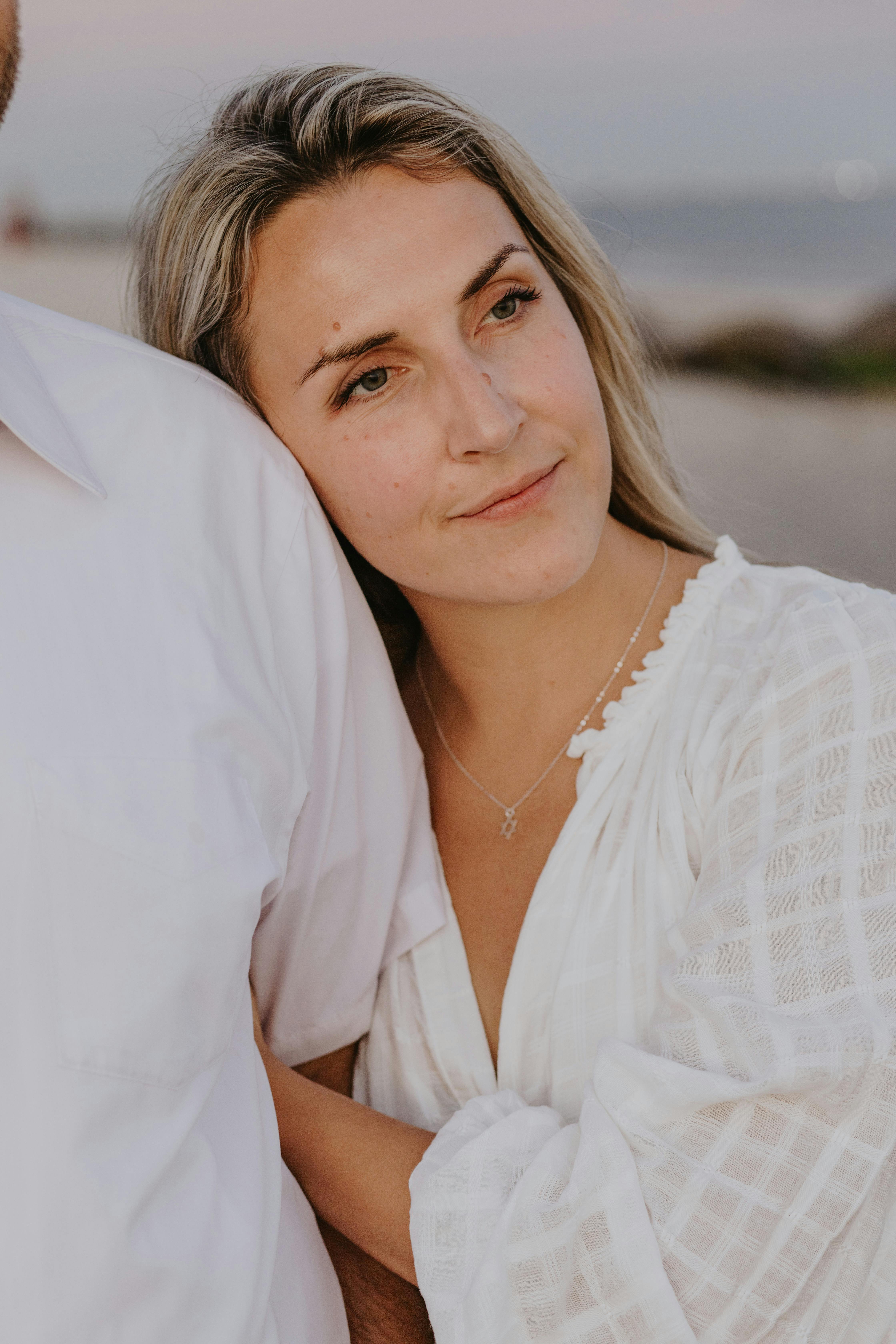 Woman Holding onto the Arm of Her Partner · Free Stock Photo