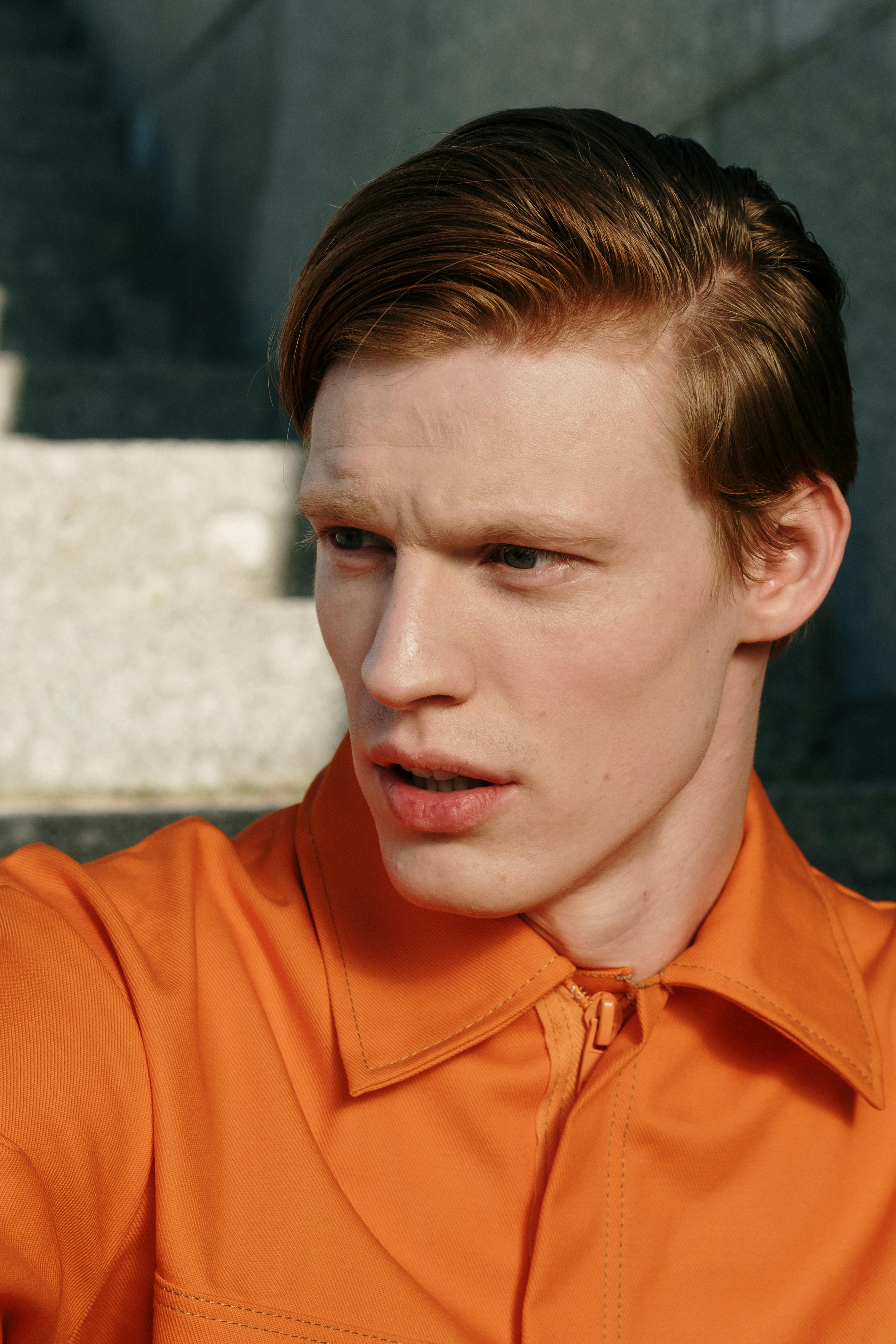 A Fine Looking Barista Holding Paper Cups while Looking Afar · Free ...