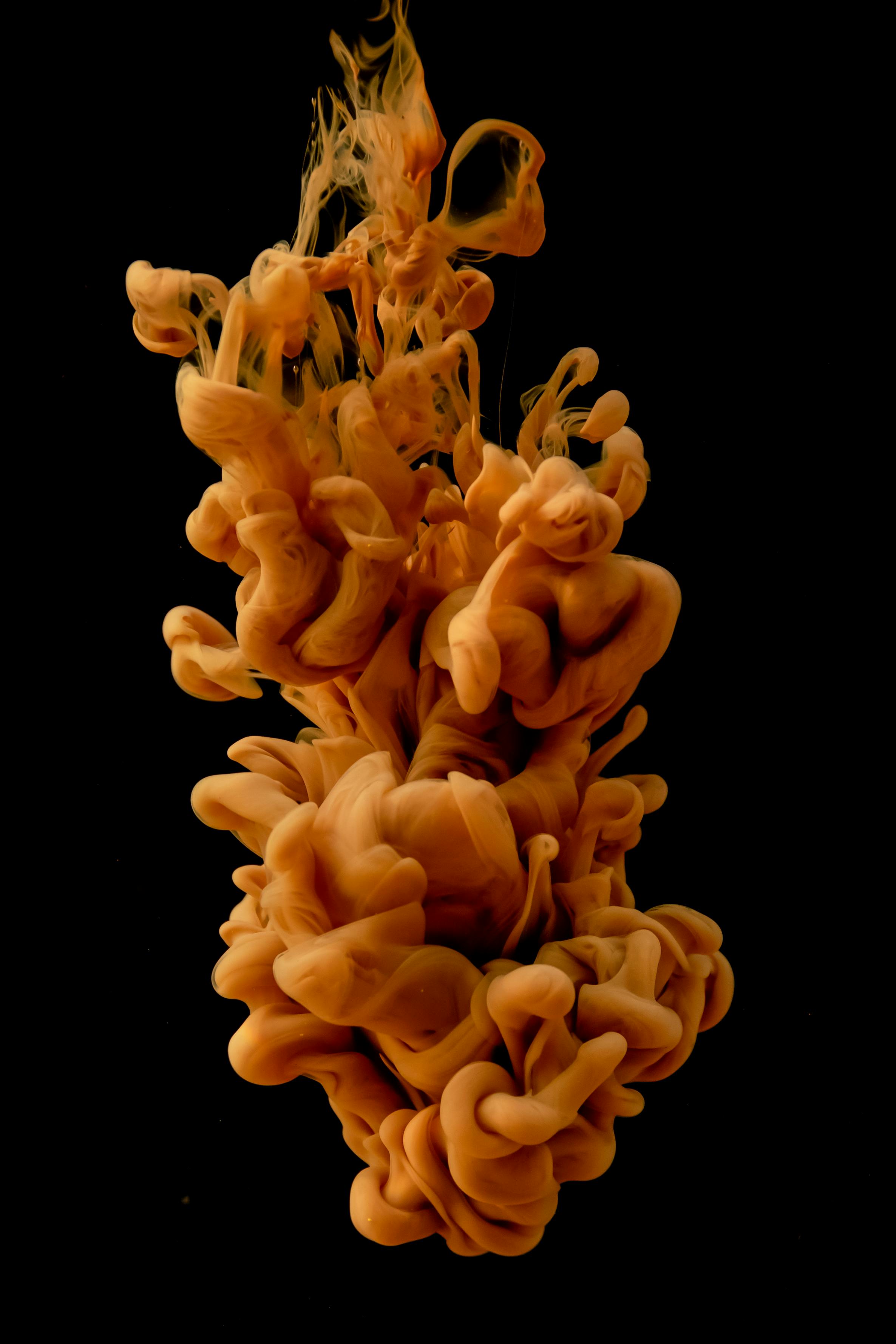 High-Speed Photography of Blue Ink Diffusion in Water · Free Stock Photo