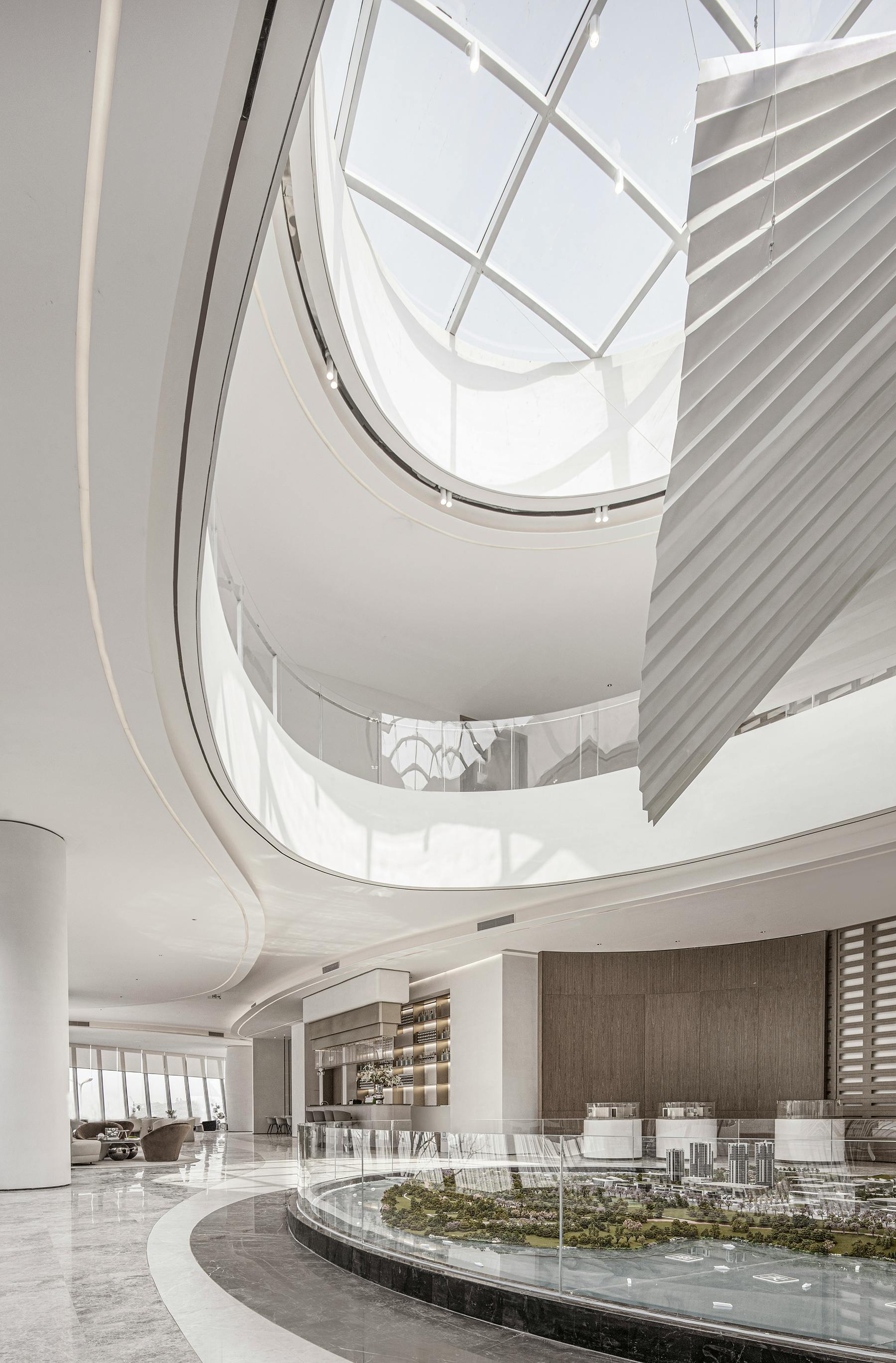 White Building With Overhead Glass Windows · Free Stock Photo