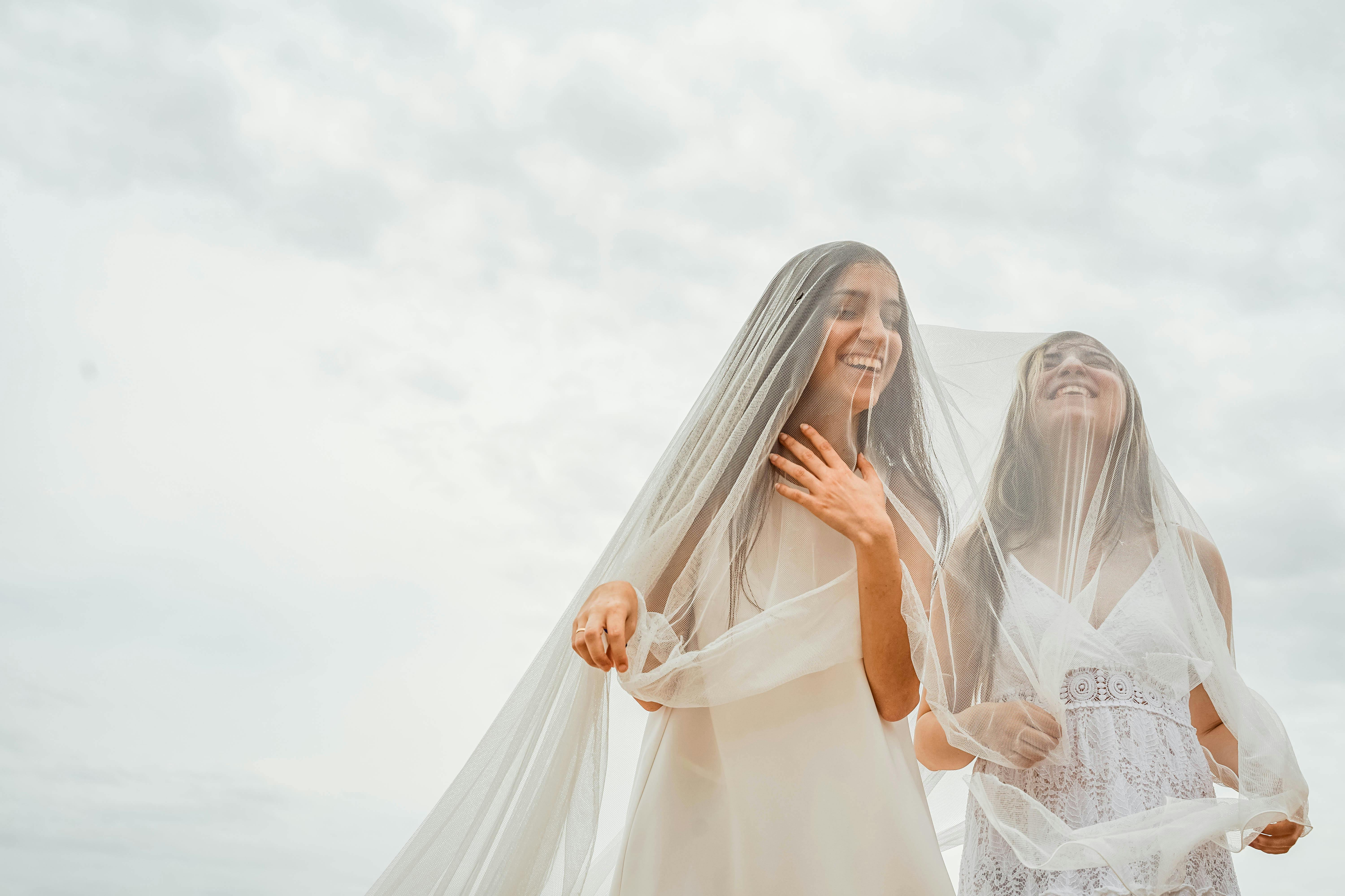 A Falling Woman Wearing a Sheer Dress · Free Stock Photo