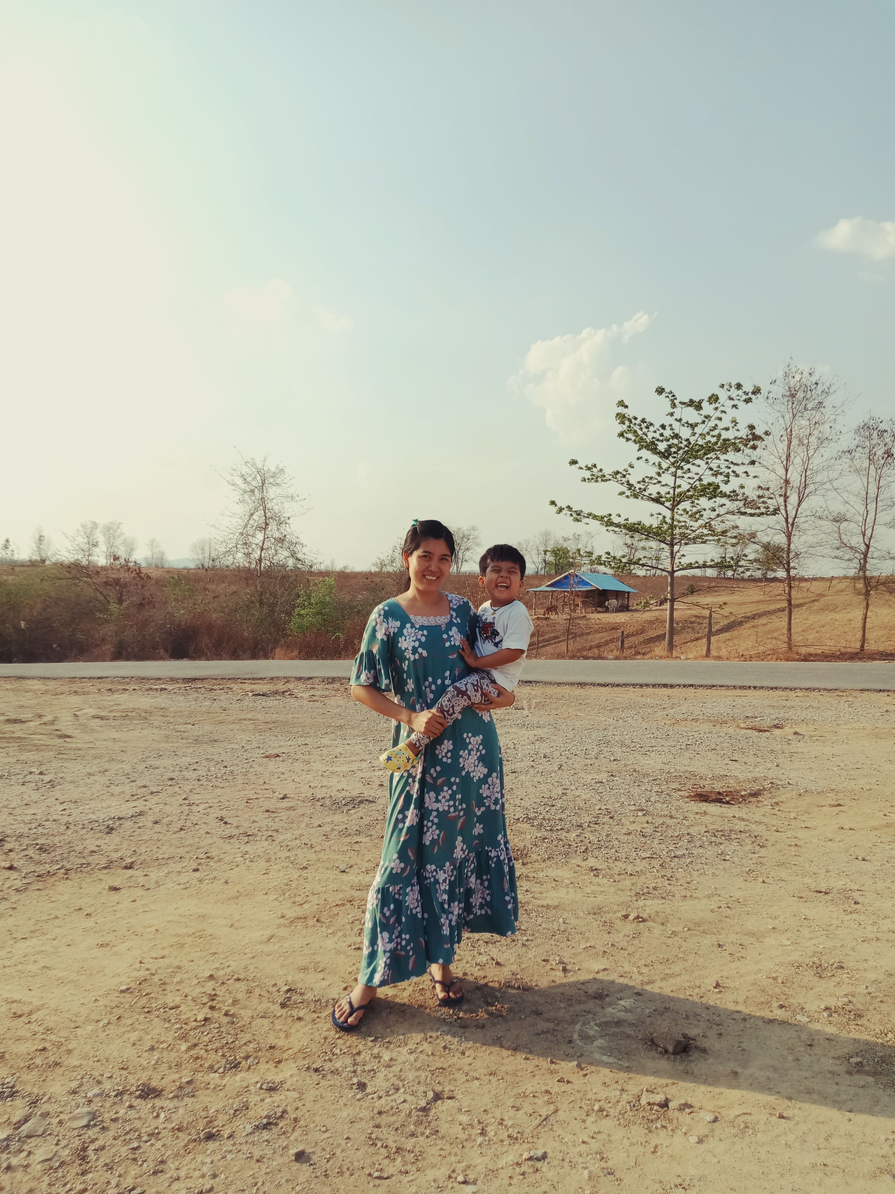 Woman with Child Posing in Countryside · Free Stock Photo