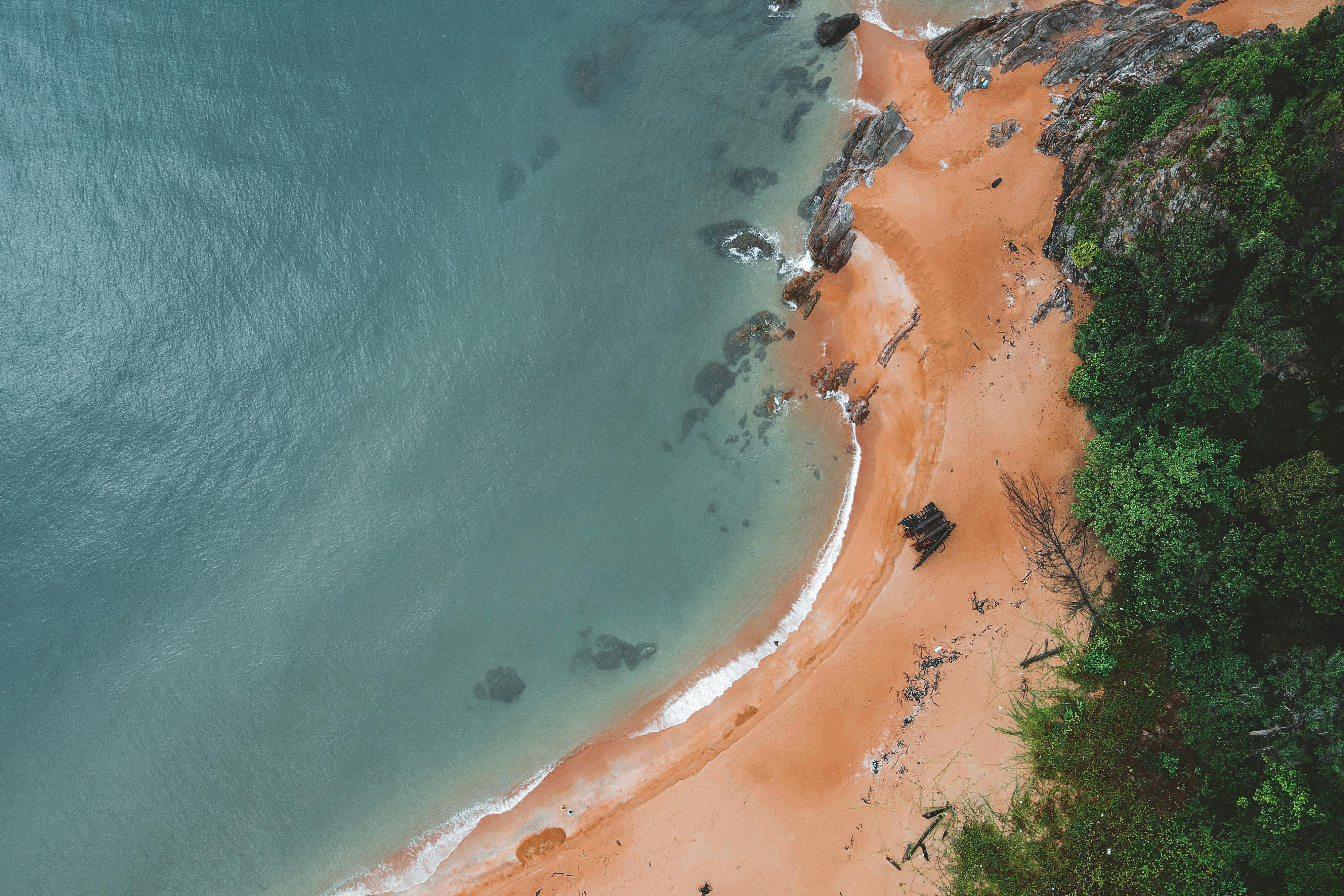 Drone Shot of a Beach with Brown Sand · Free Stock Photo