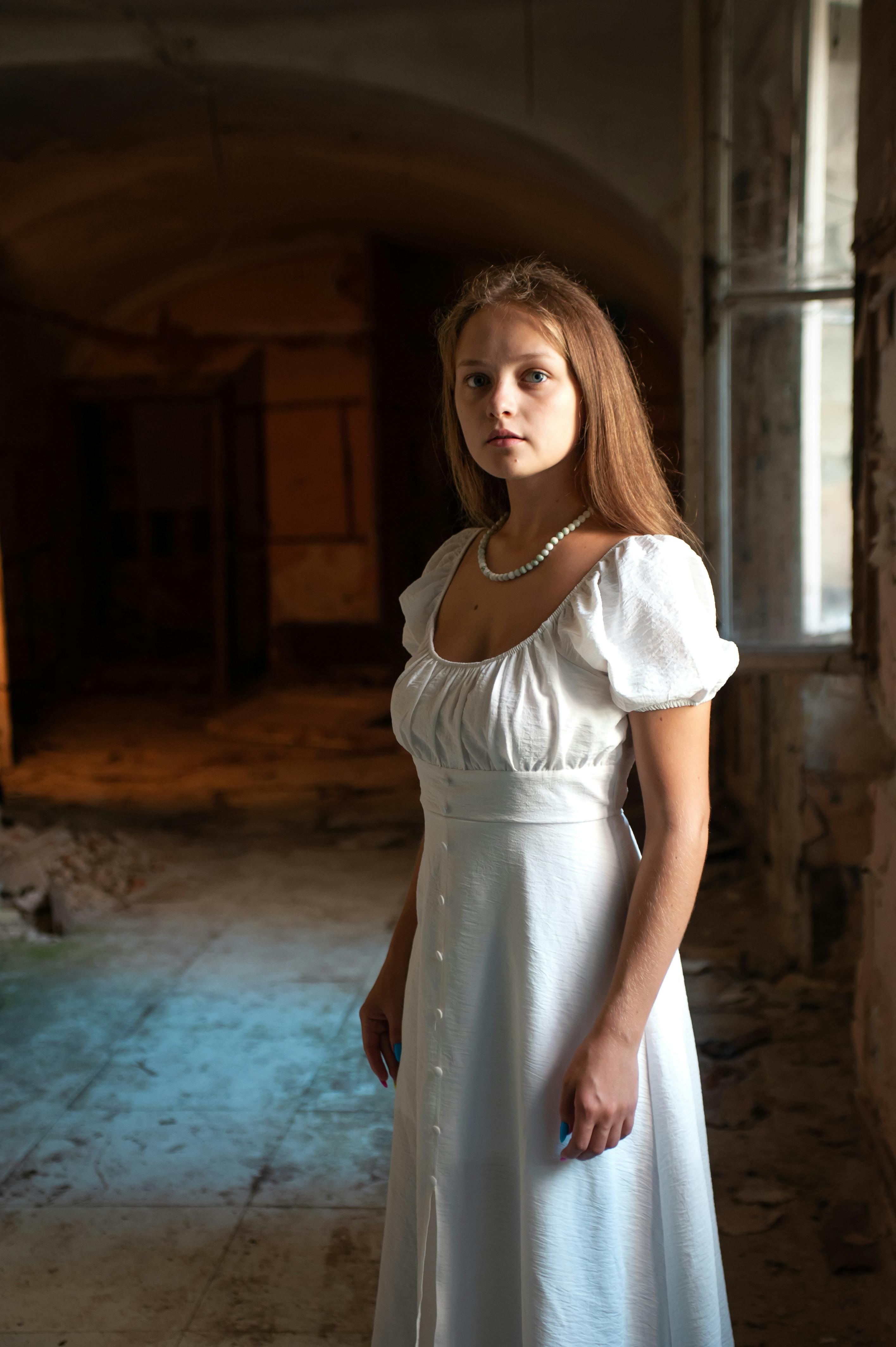 A Woman in White Dress Inside an Abandoned Building · Free Stock Photo