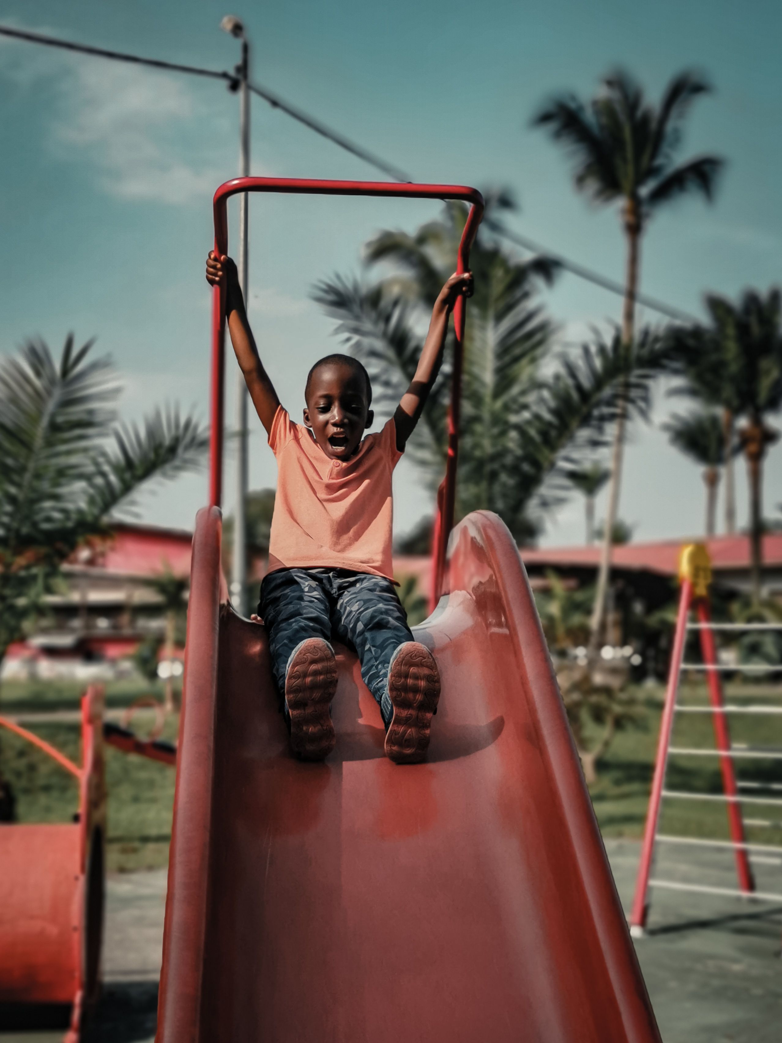 A Boy on a Slide · Free Stock Photo