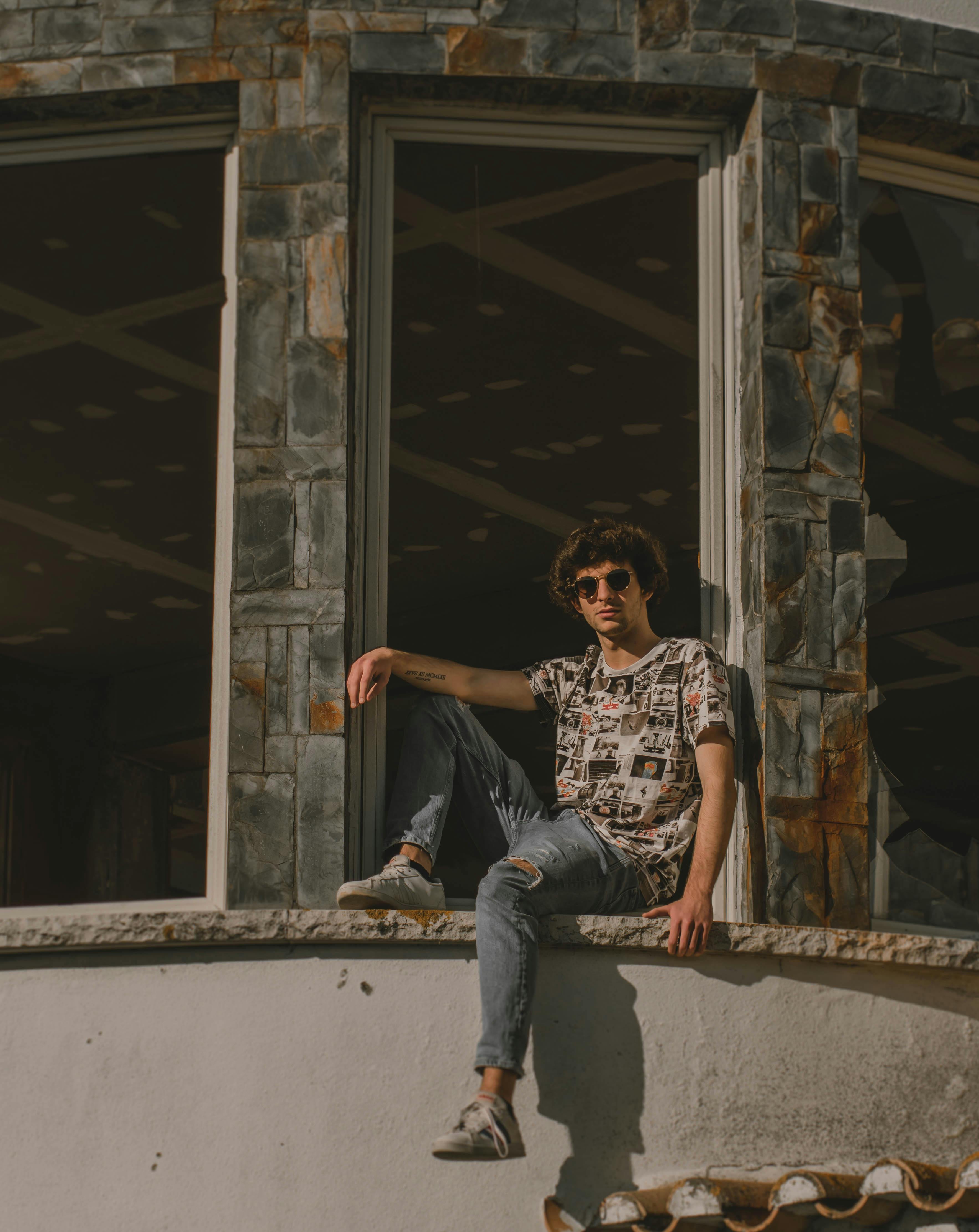 Sitting Man Face behind Windows · Free Stock Photo