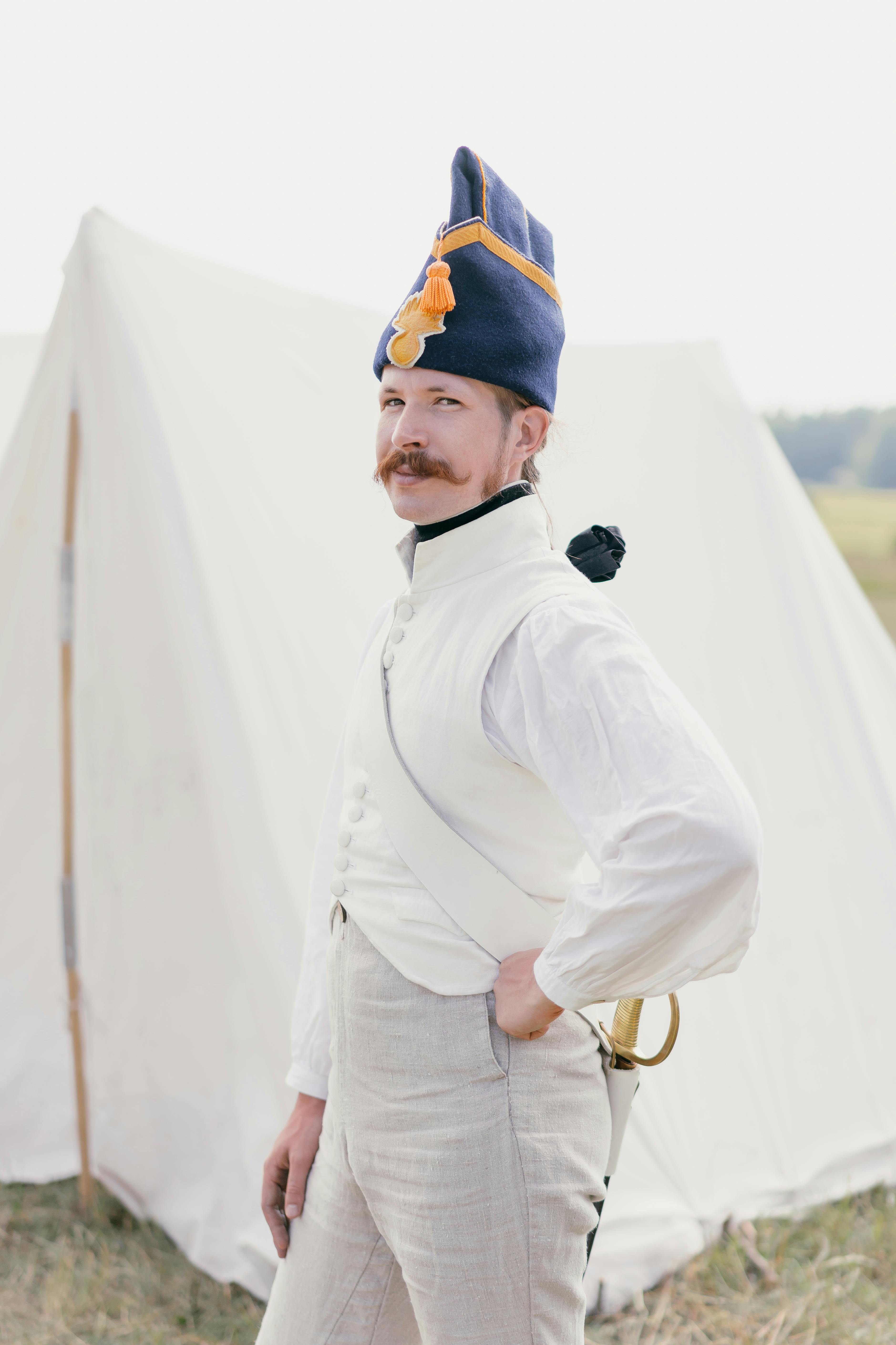 Proud Man with Mustache in Historic Soldier Uniform · Free Stock Photo