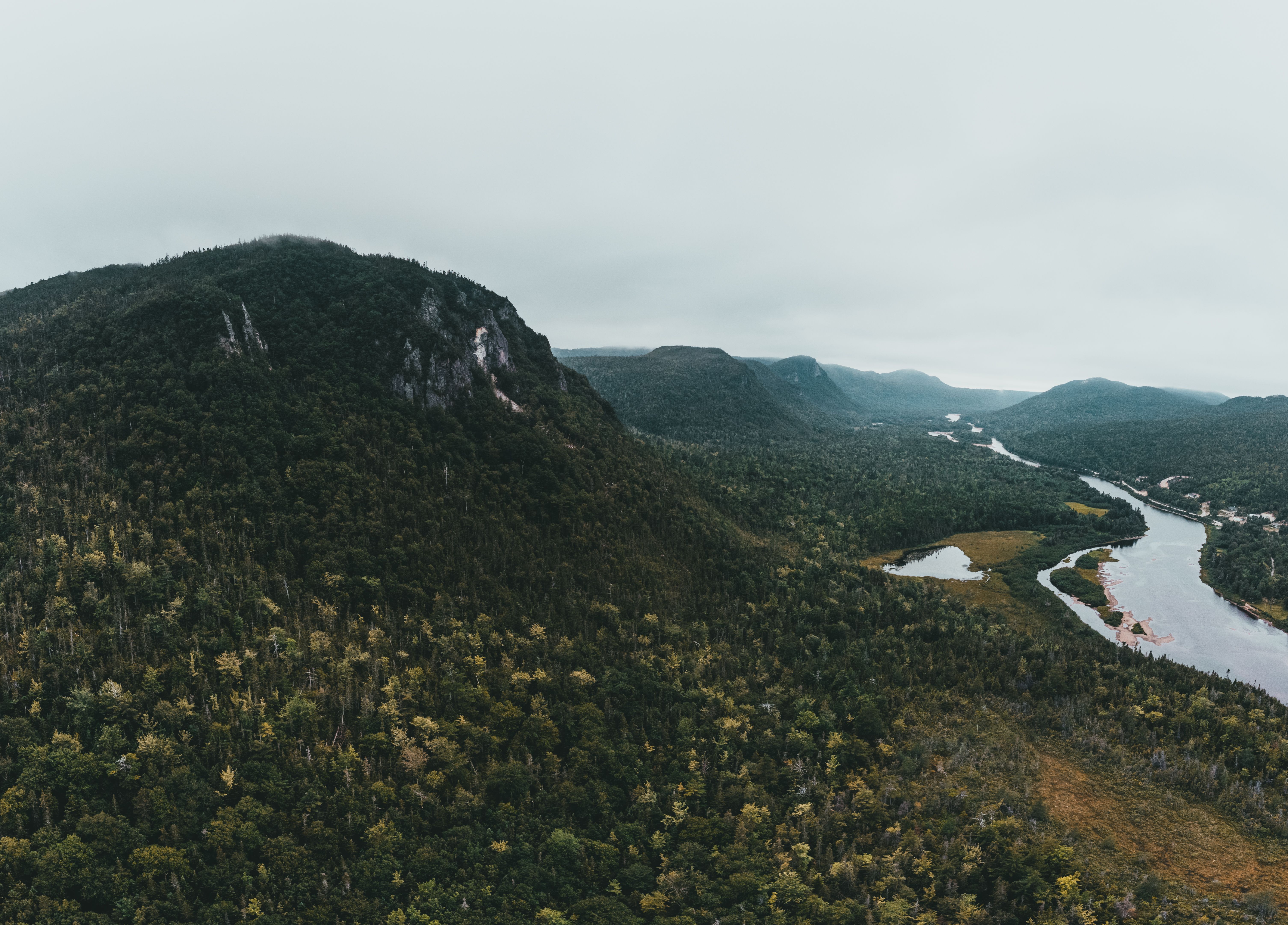 Dark Landscape with River in a Valley and Mountain Peaks in Fog · Free ...