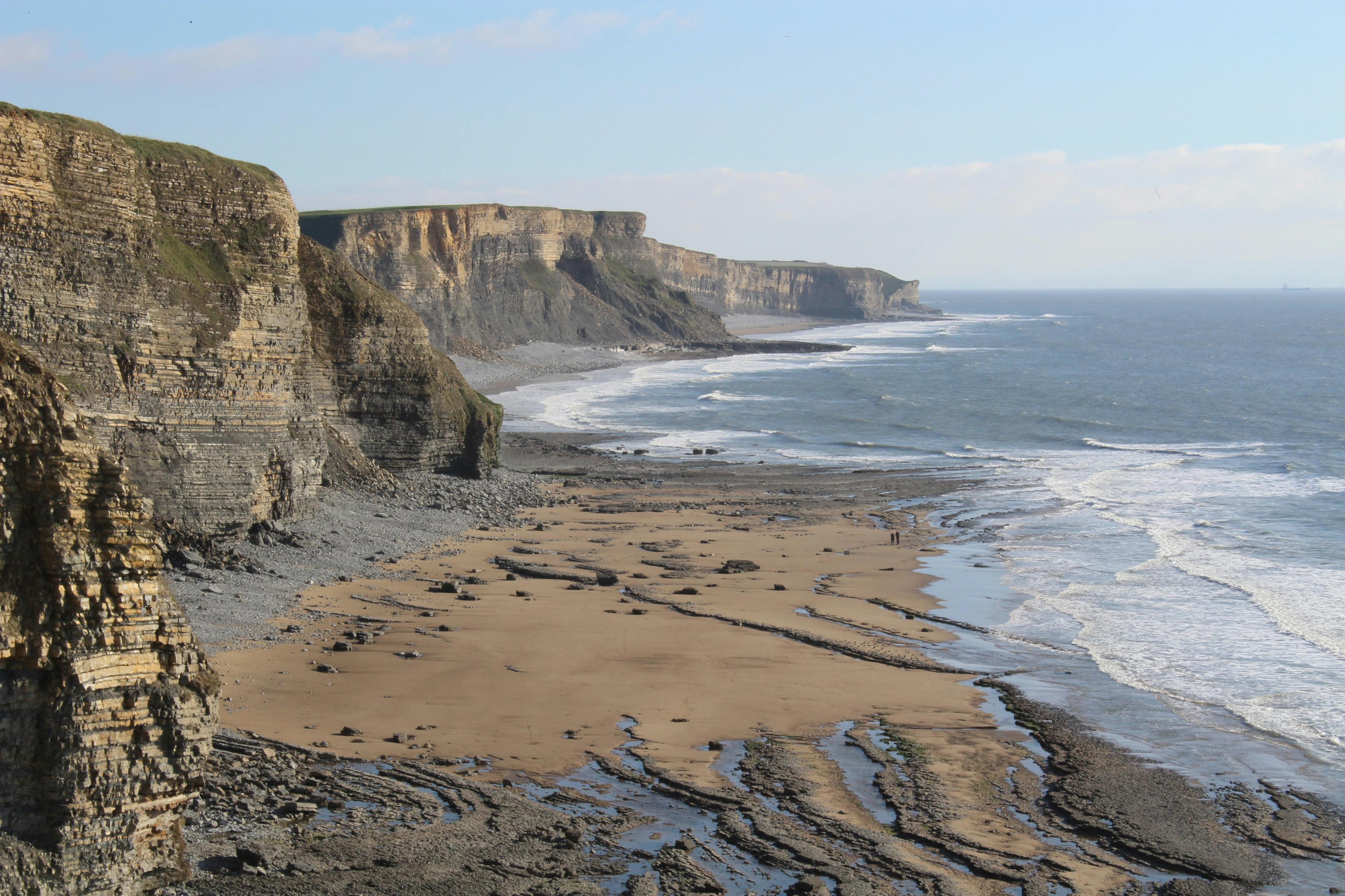 Body of Water Near Cliff Under the Sky · Free Stock Photo