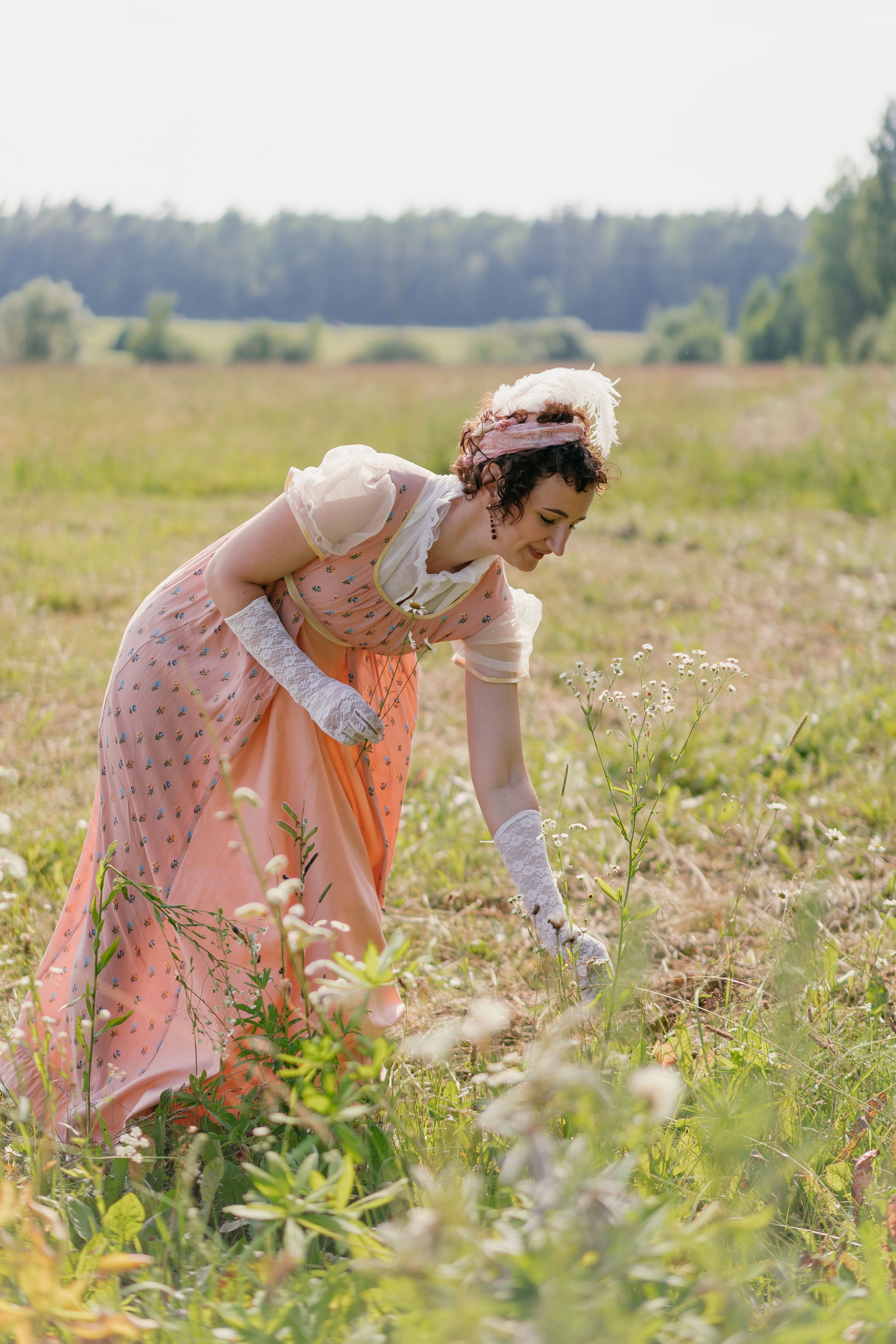 A Woman in Pink Dress Picking Flowers · Free Stock Photo