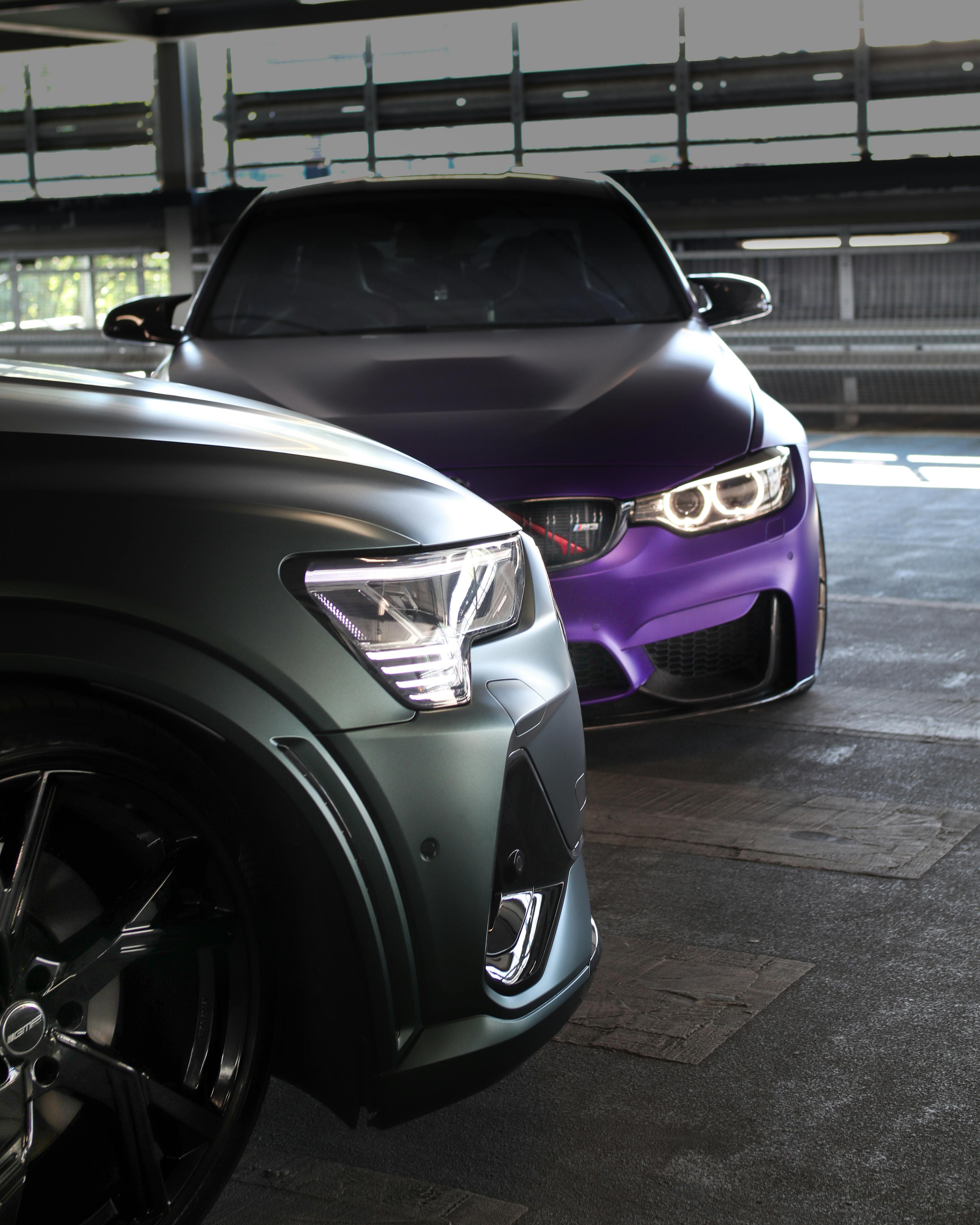 Close-Up Shot of Matte Black and Purple Cars · Free Stock Photo