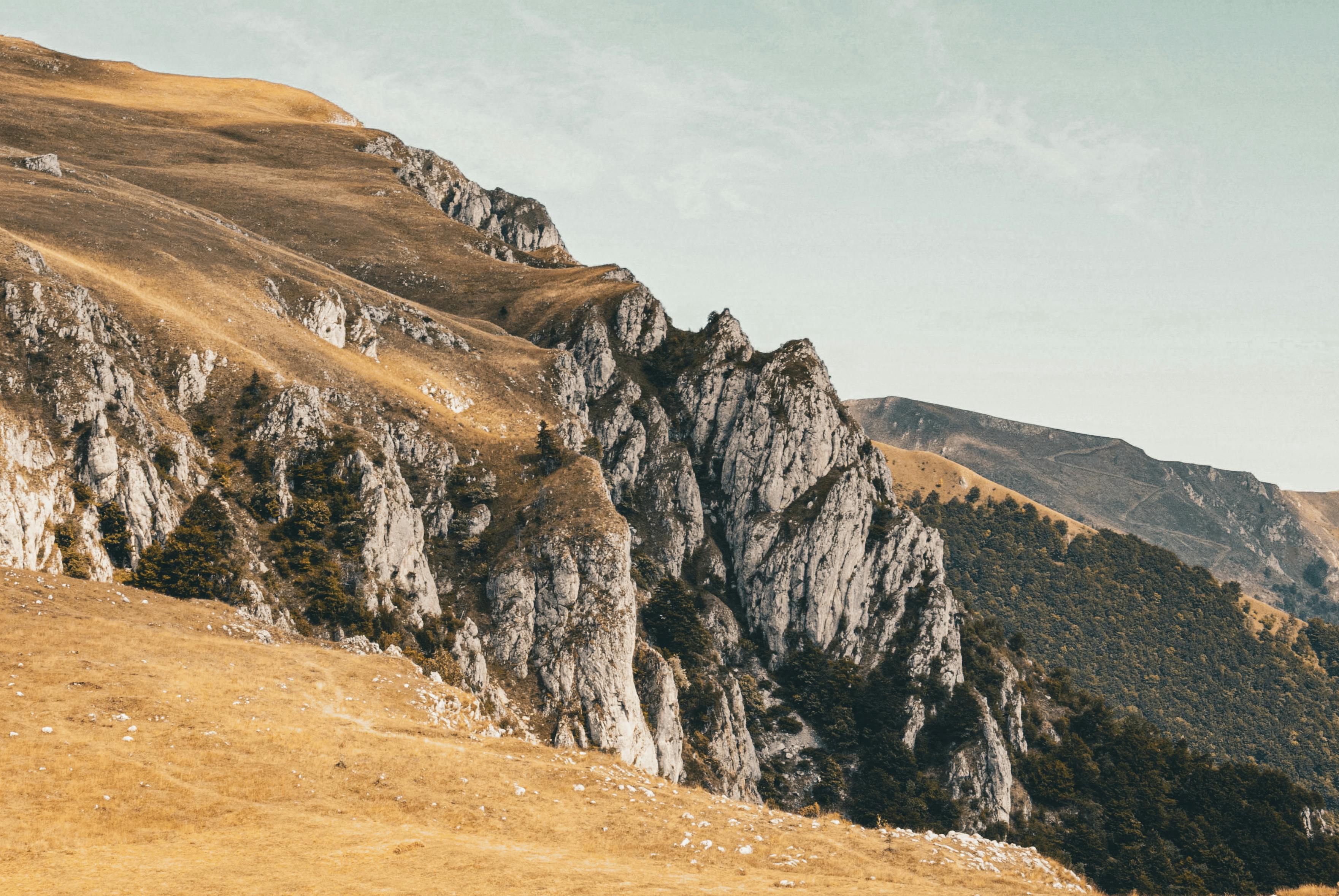 Grey Rocky Mountain during Day Time · Free Stock Photo