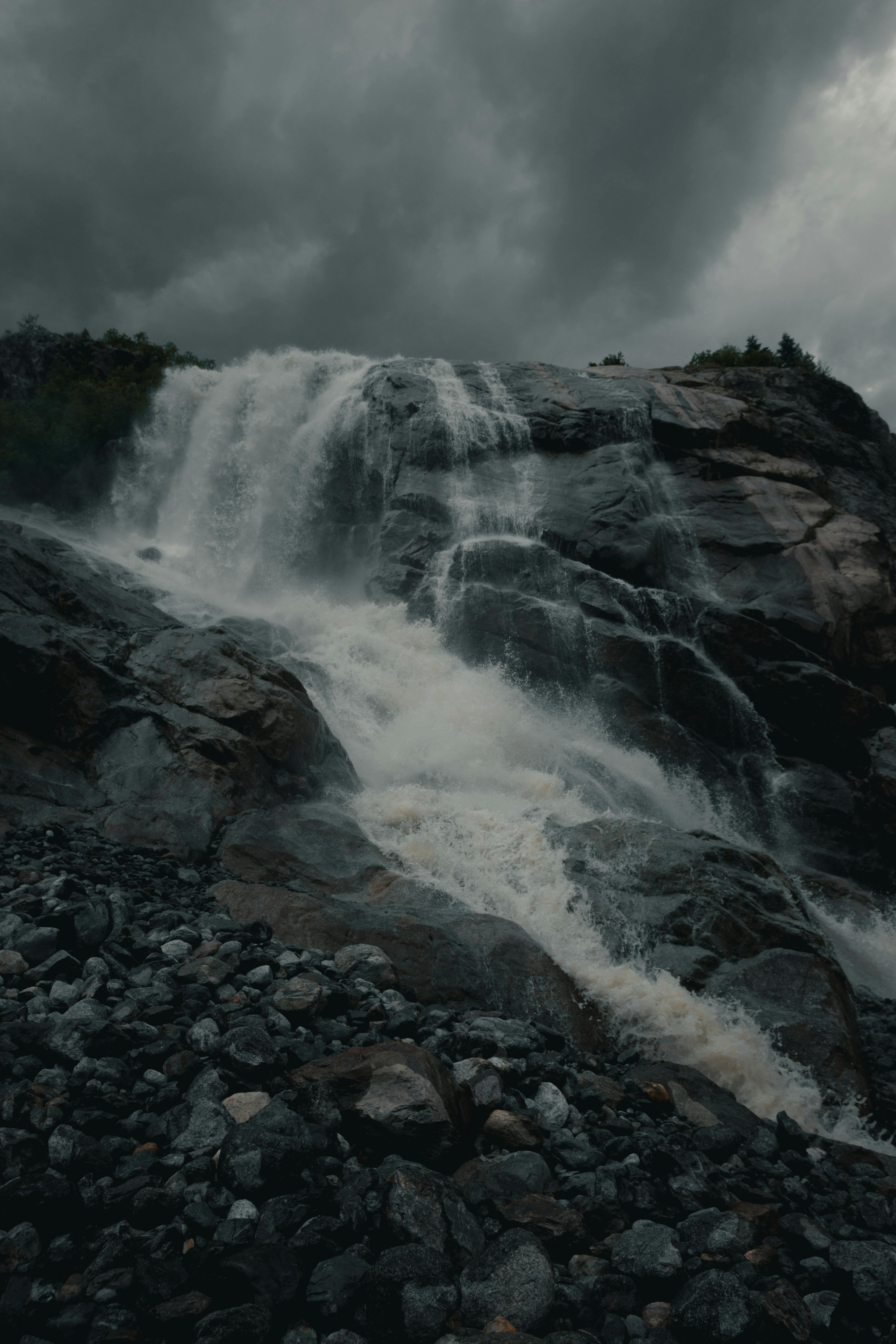 Waterfalls under a Cloudy Sky · Free Stock Photo