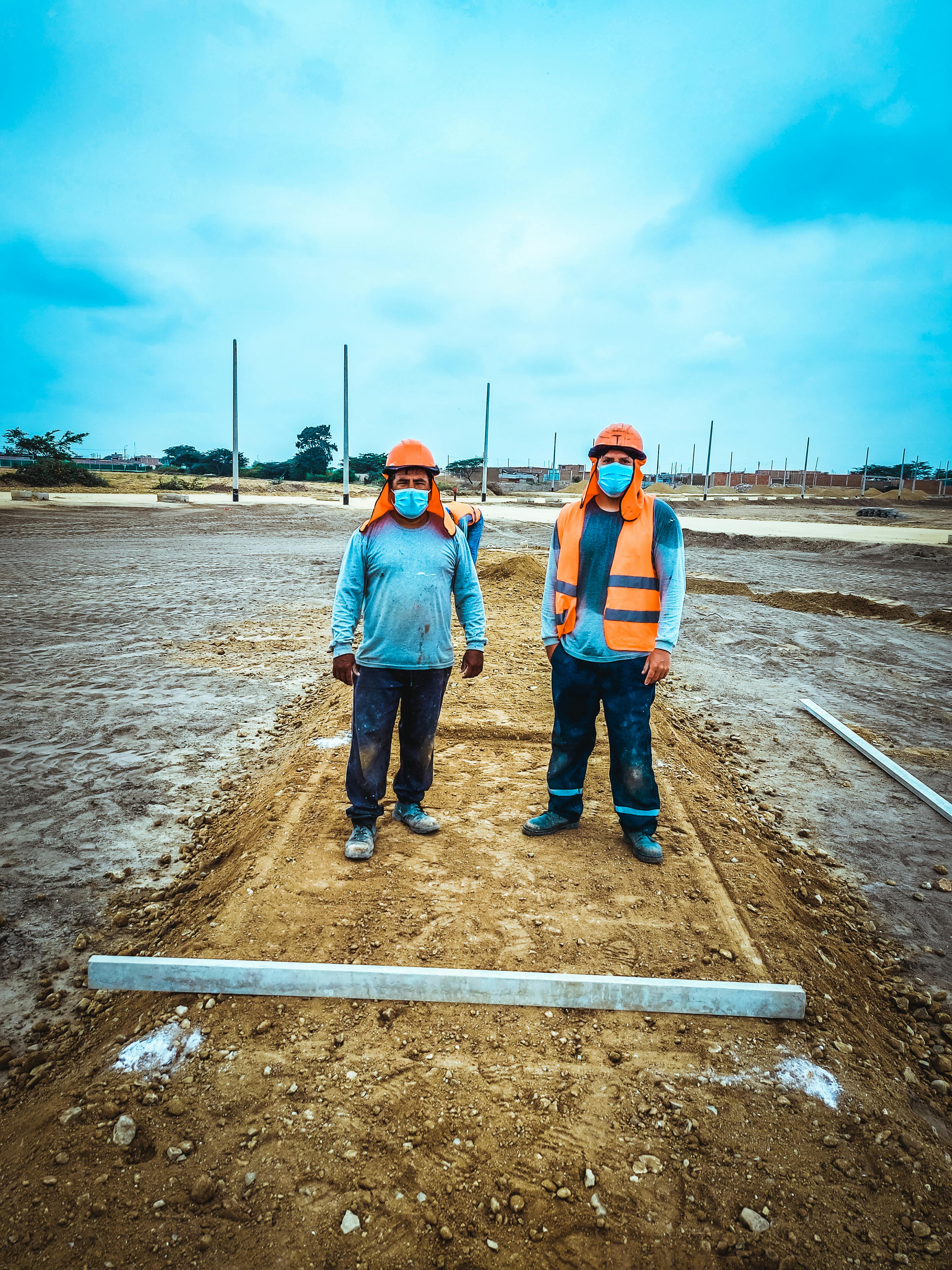 2 Man on Construction Site during Daytime · Free Stock Photo