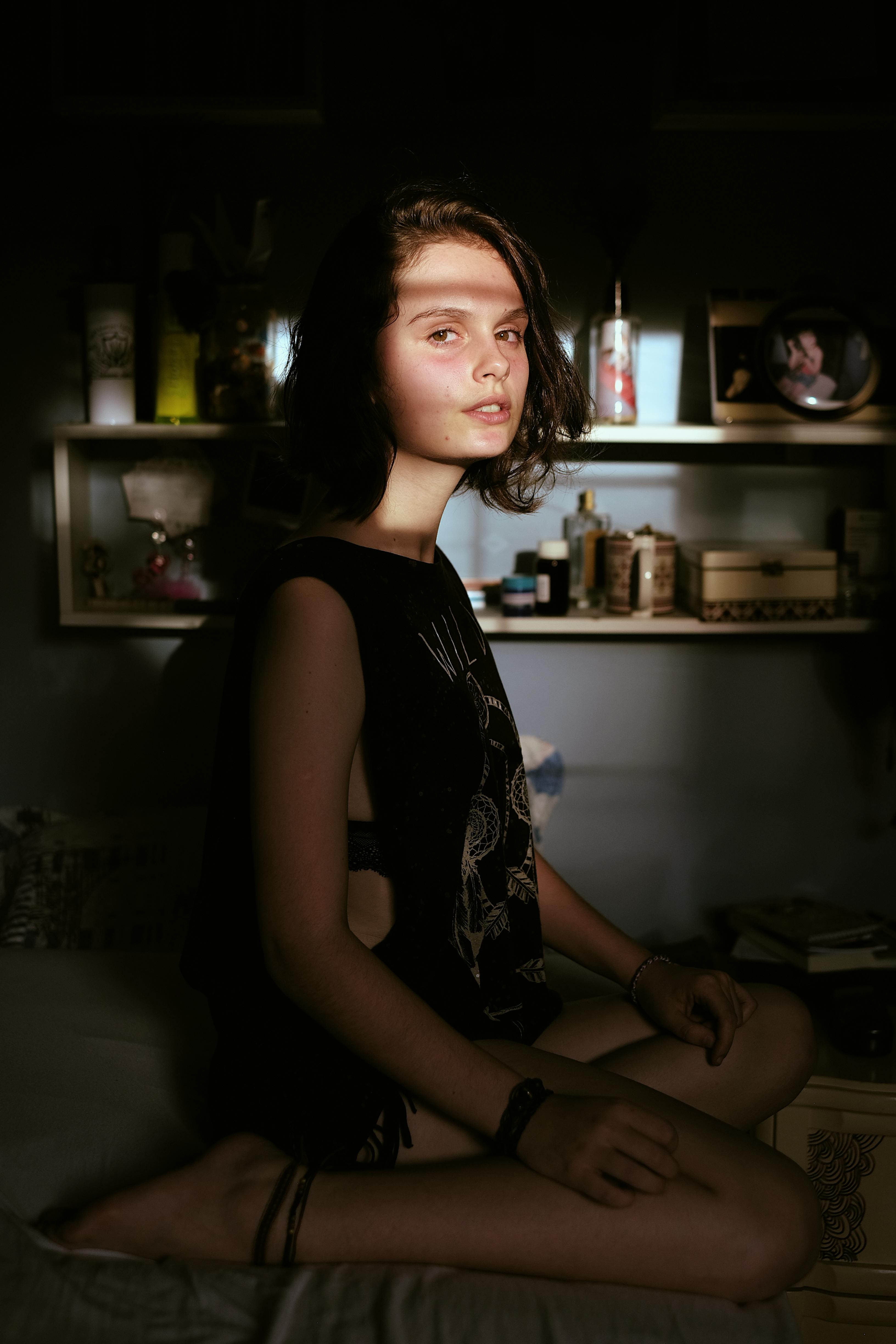 Girl Posing in Light Shadow · Free Stock Photo