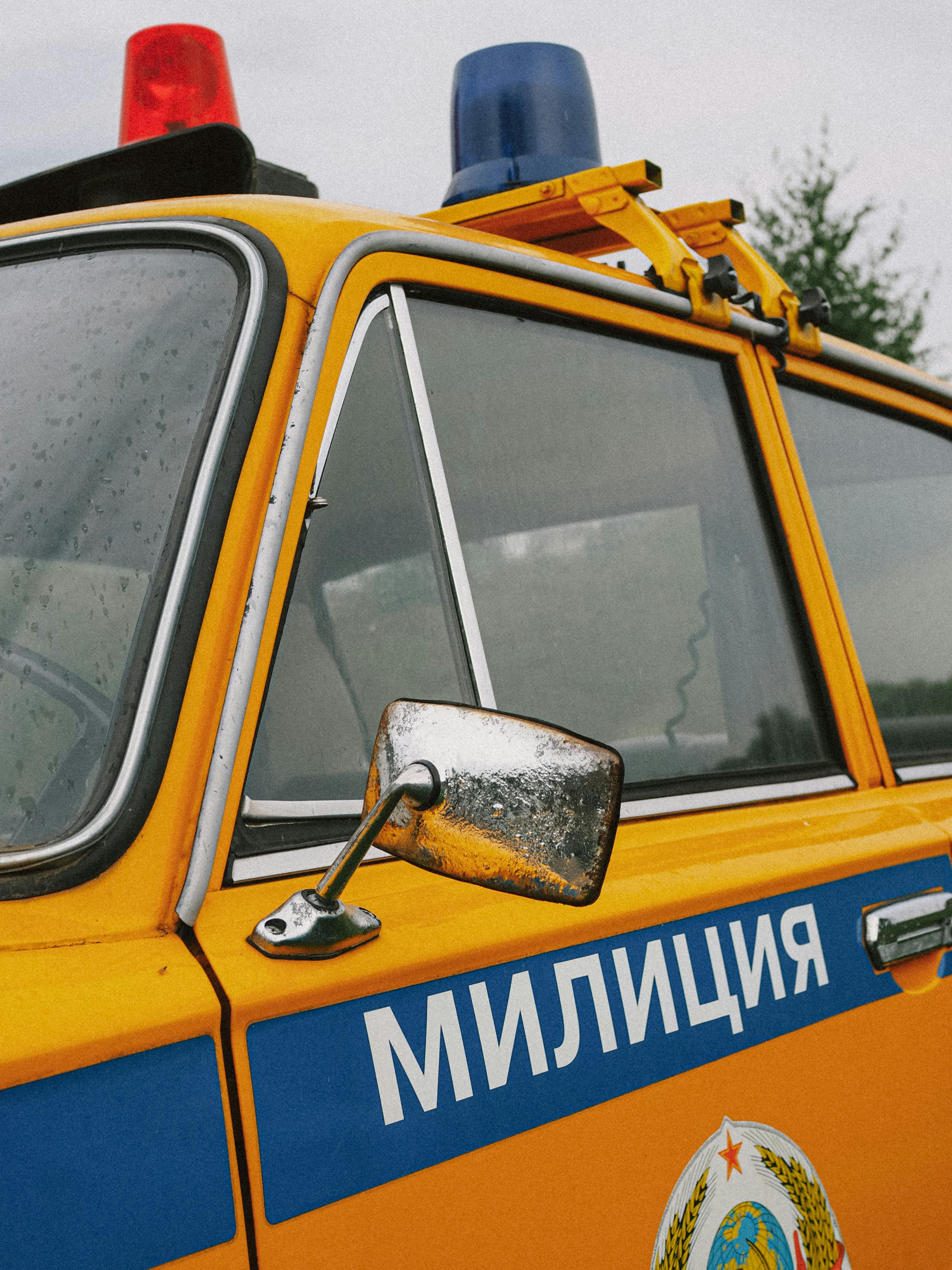 Police Car Parked Near Building · Free Stock Photo
