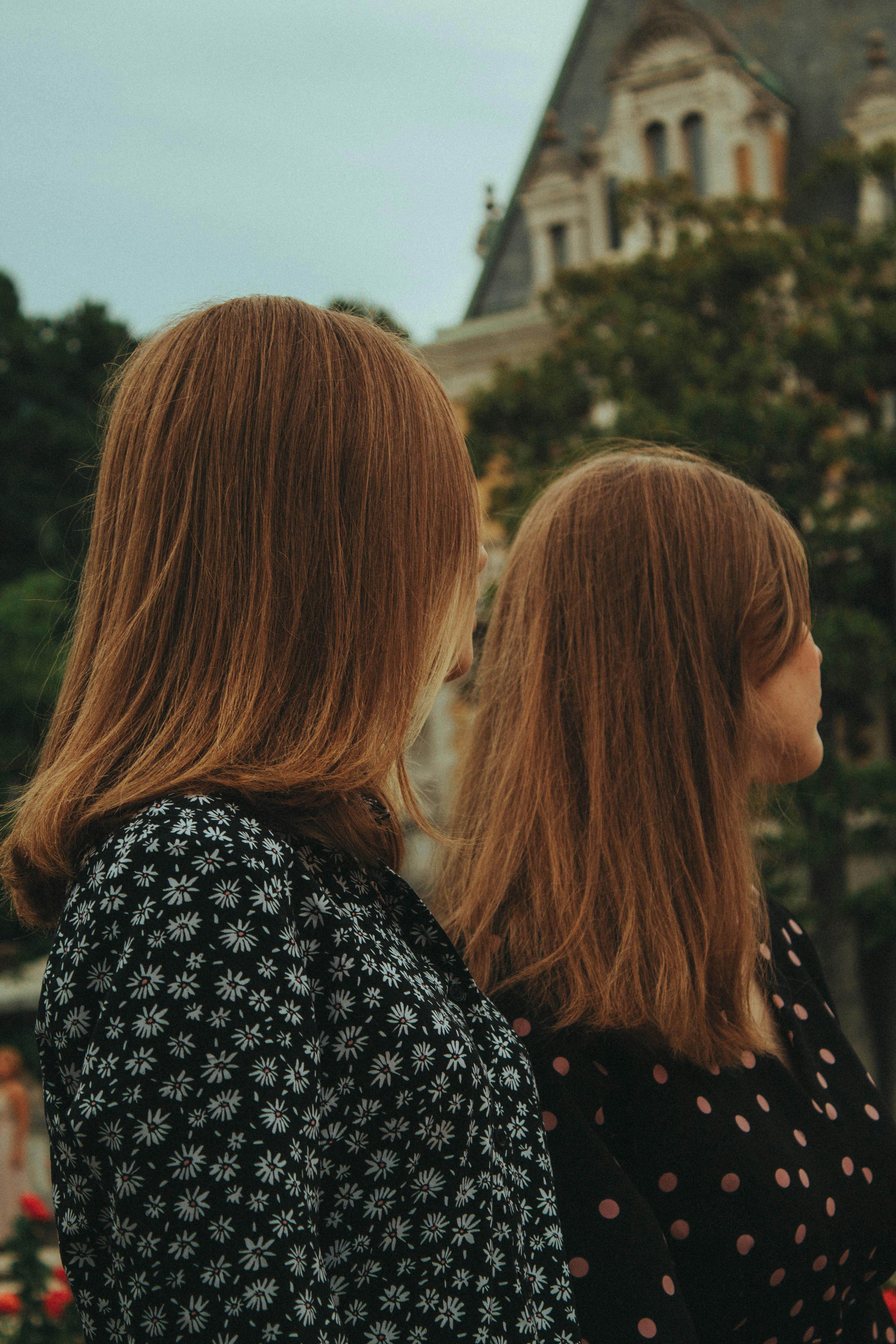 Two Women in Floral Dresses · Free Stock Photo