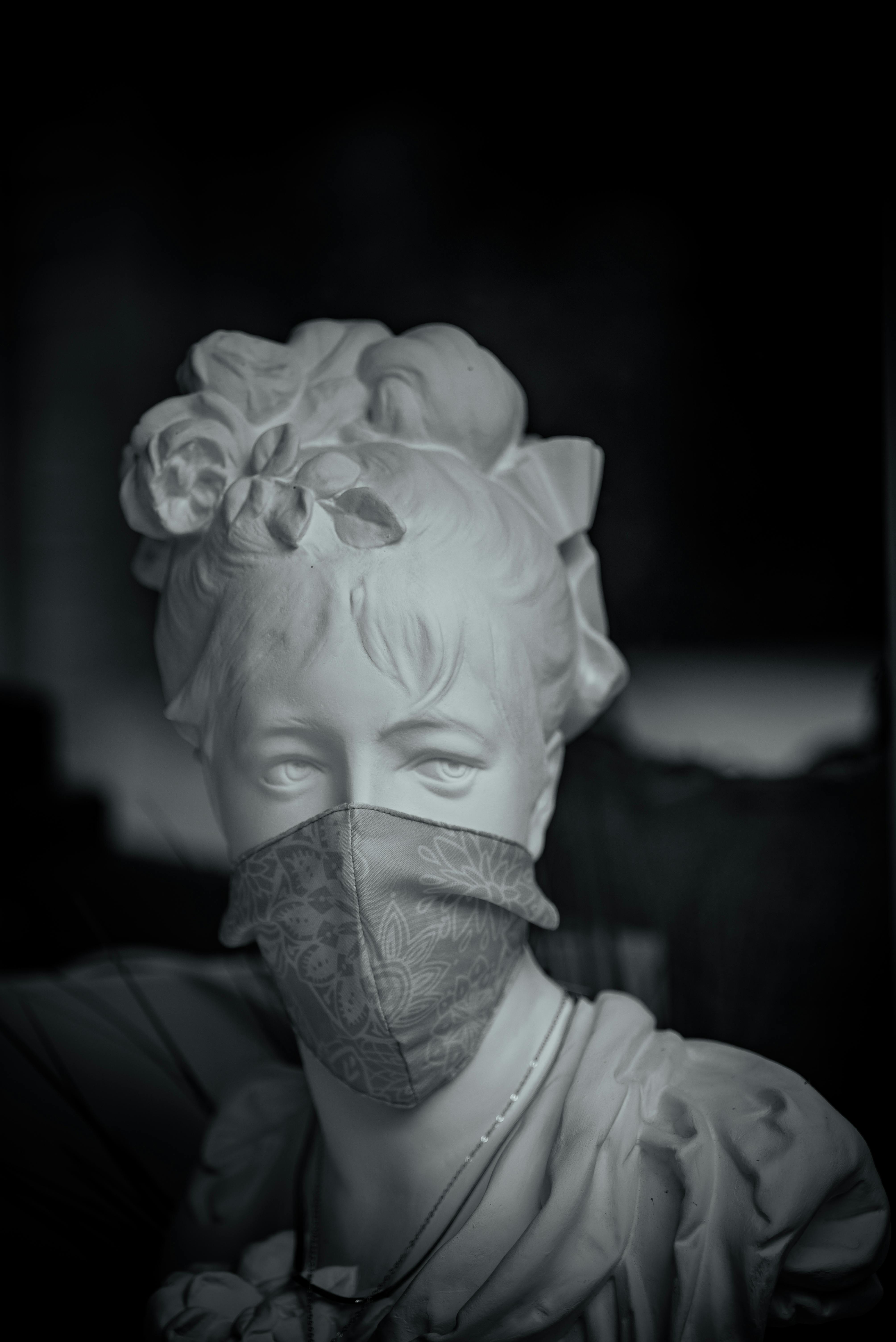 A Concrete Statue of a Man · Free Stock Photo