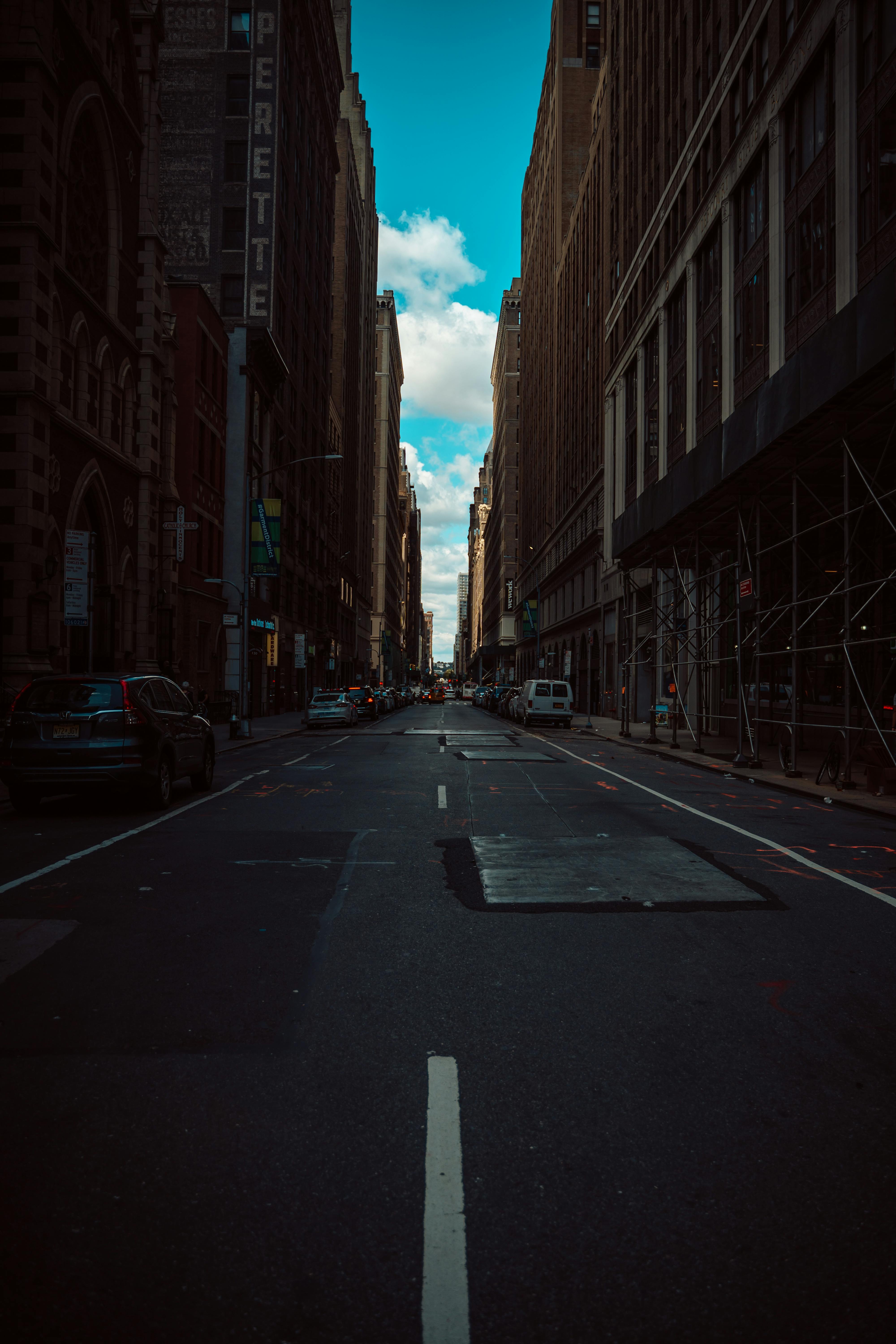 A Road in Between Buildings · Free Stock Photo