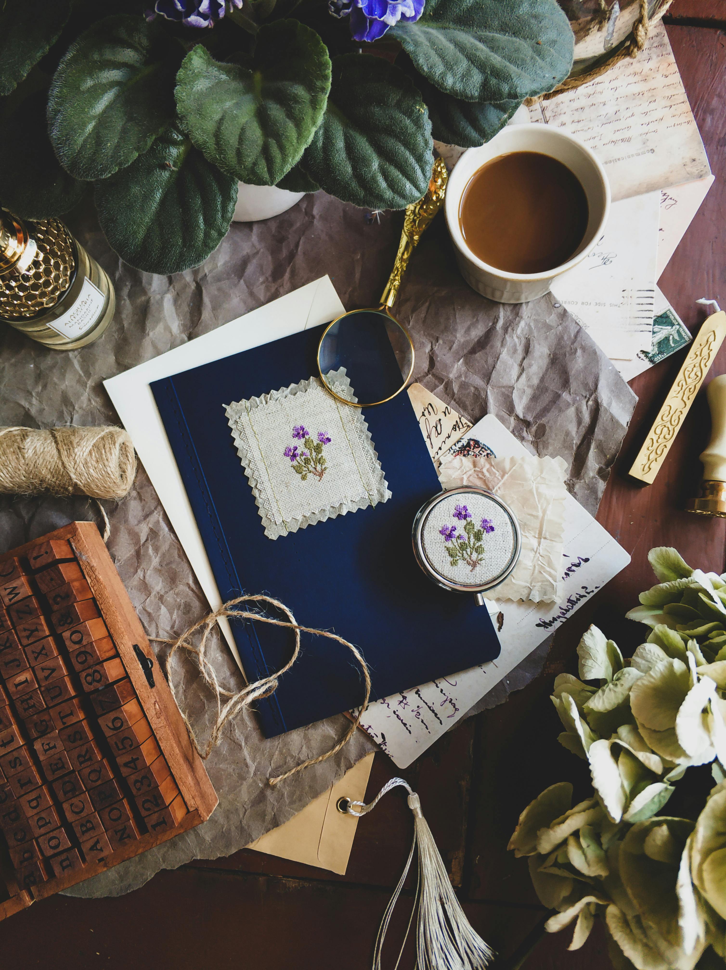 Top View of a Table with a Plant, Drink and Items for Doing Crafts ...
