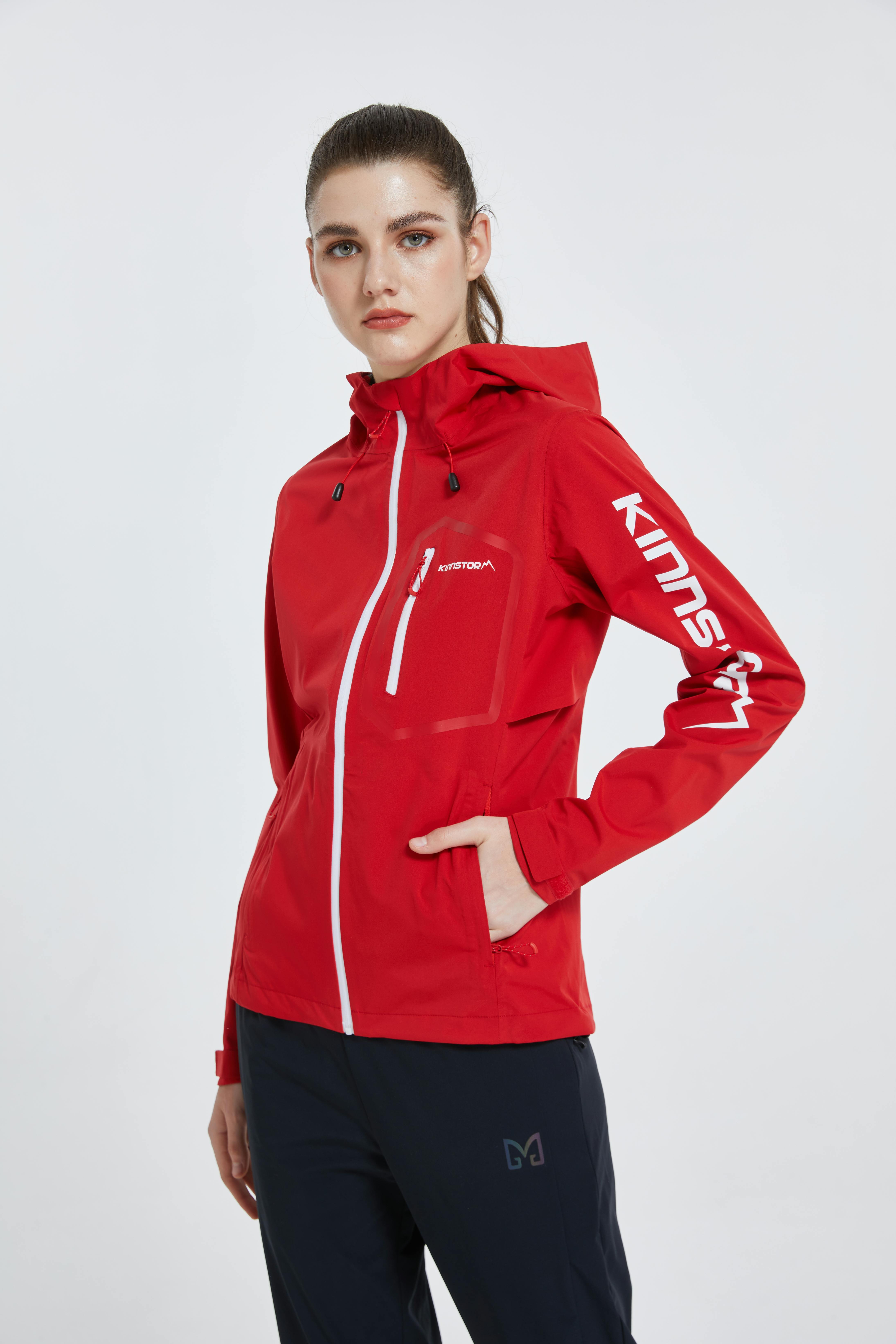 A Model Posing While Wearing a Red Jacket · Free Stock Photo