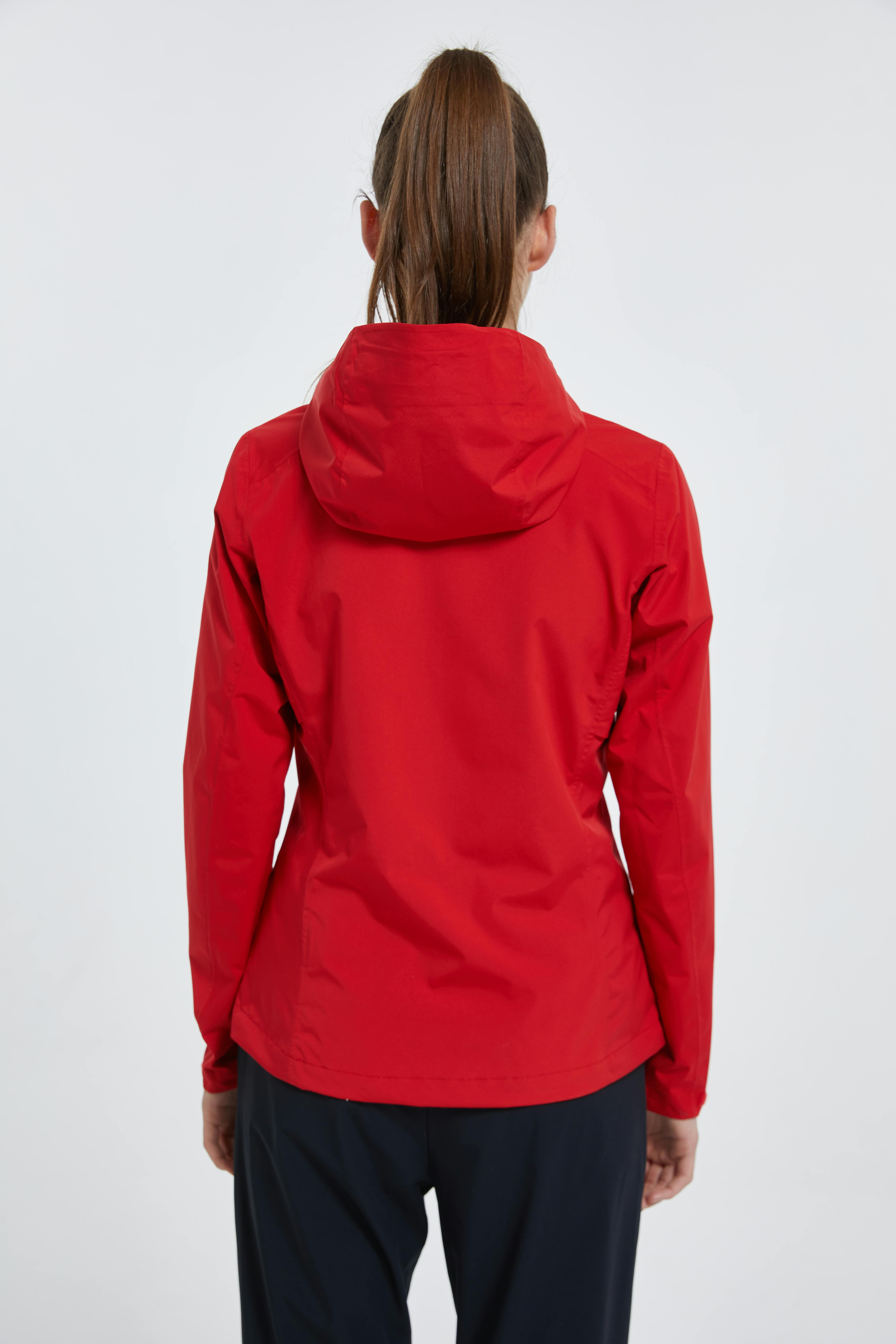 Back View of a Woman in a Red Jacket · Free Stock Photo