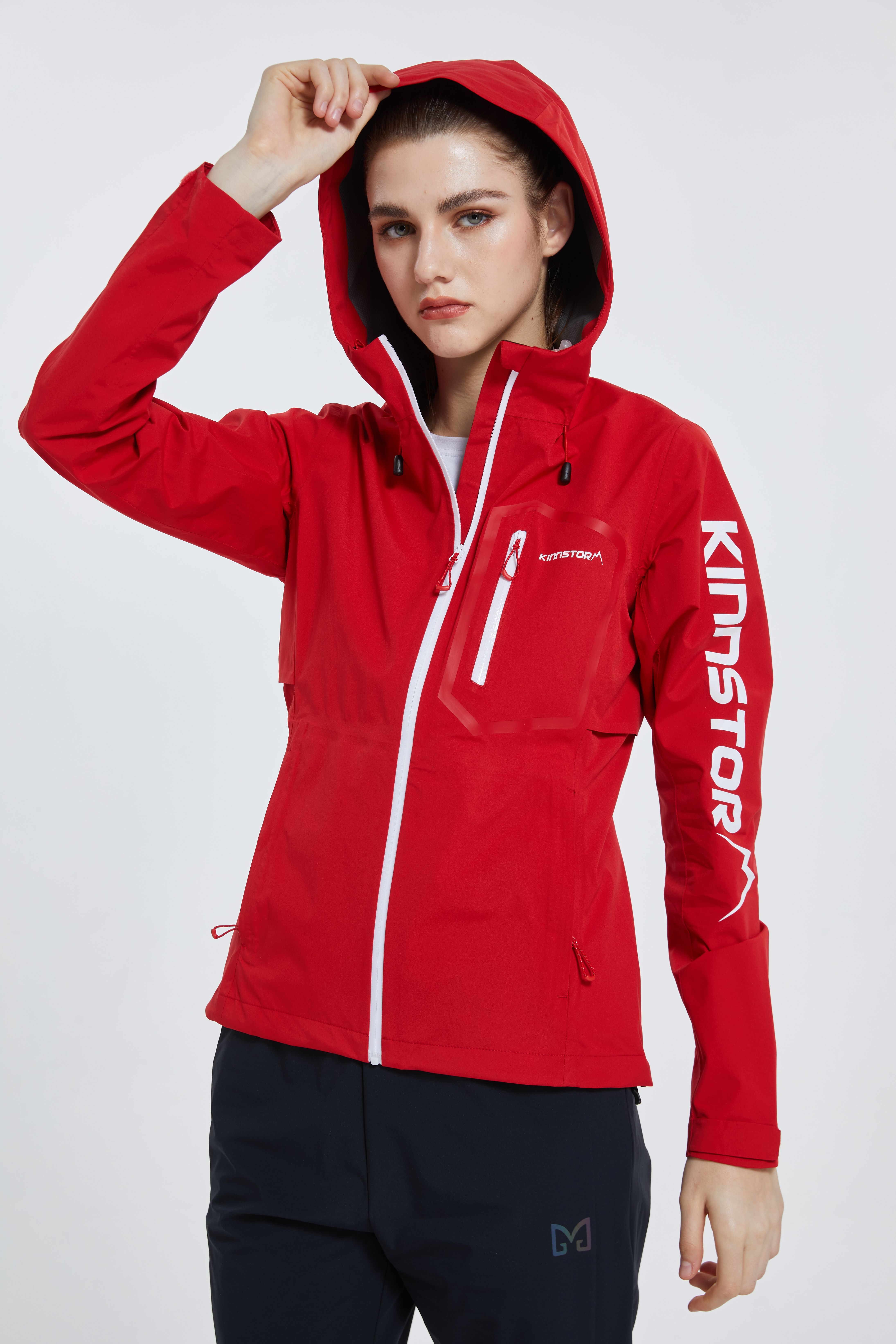A Young Woman Posing in a Red Jacket · Free Stock Photo