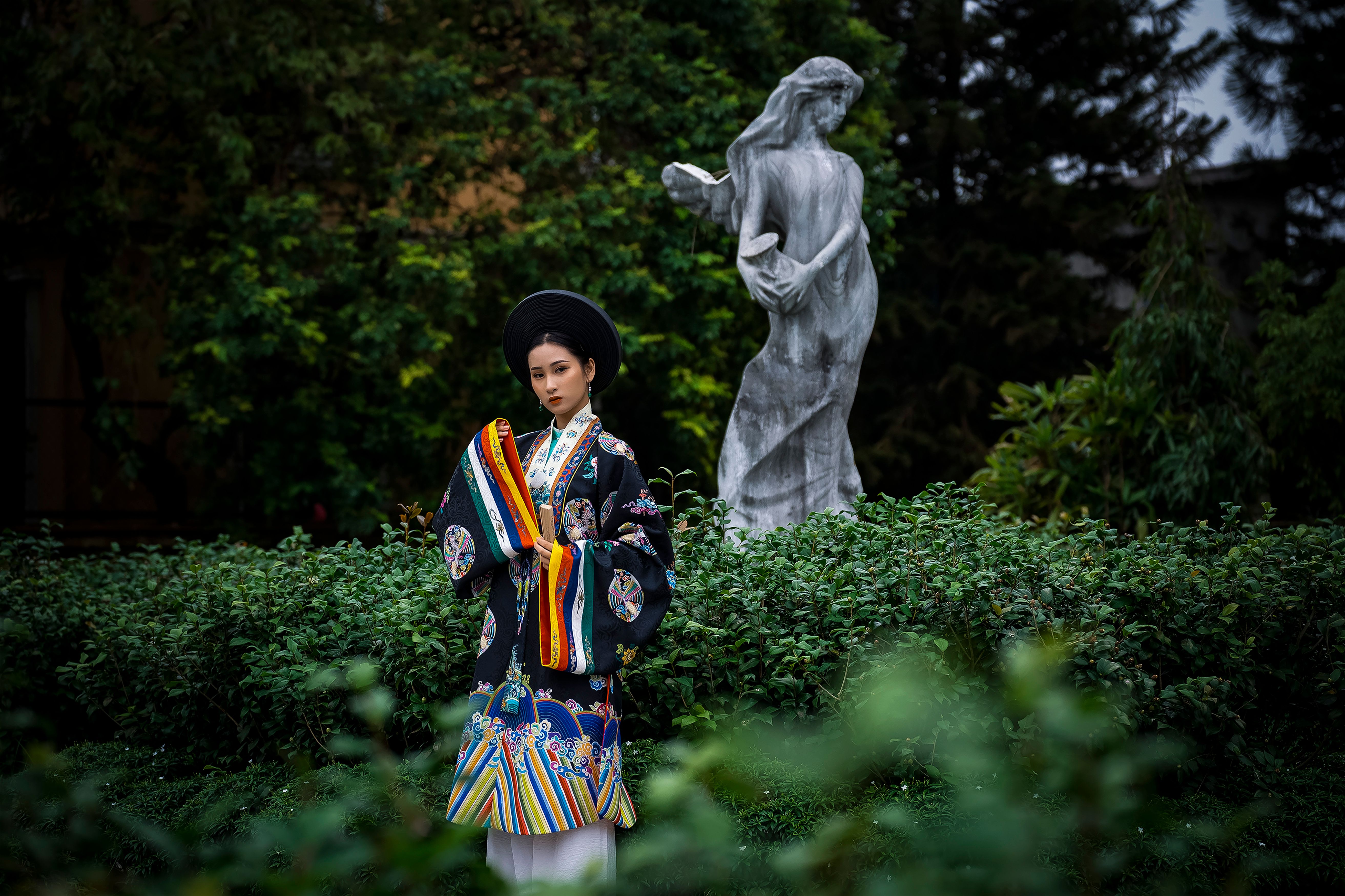 Beautiful Woman Wearing Traditional Clothing near a Statue · Free Stock ...
