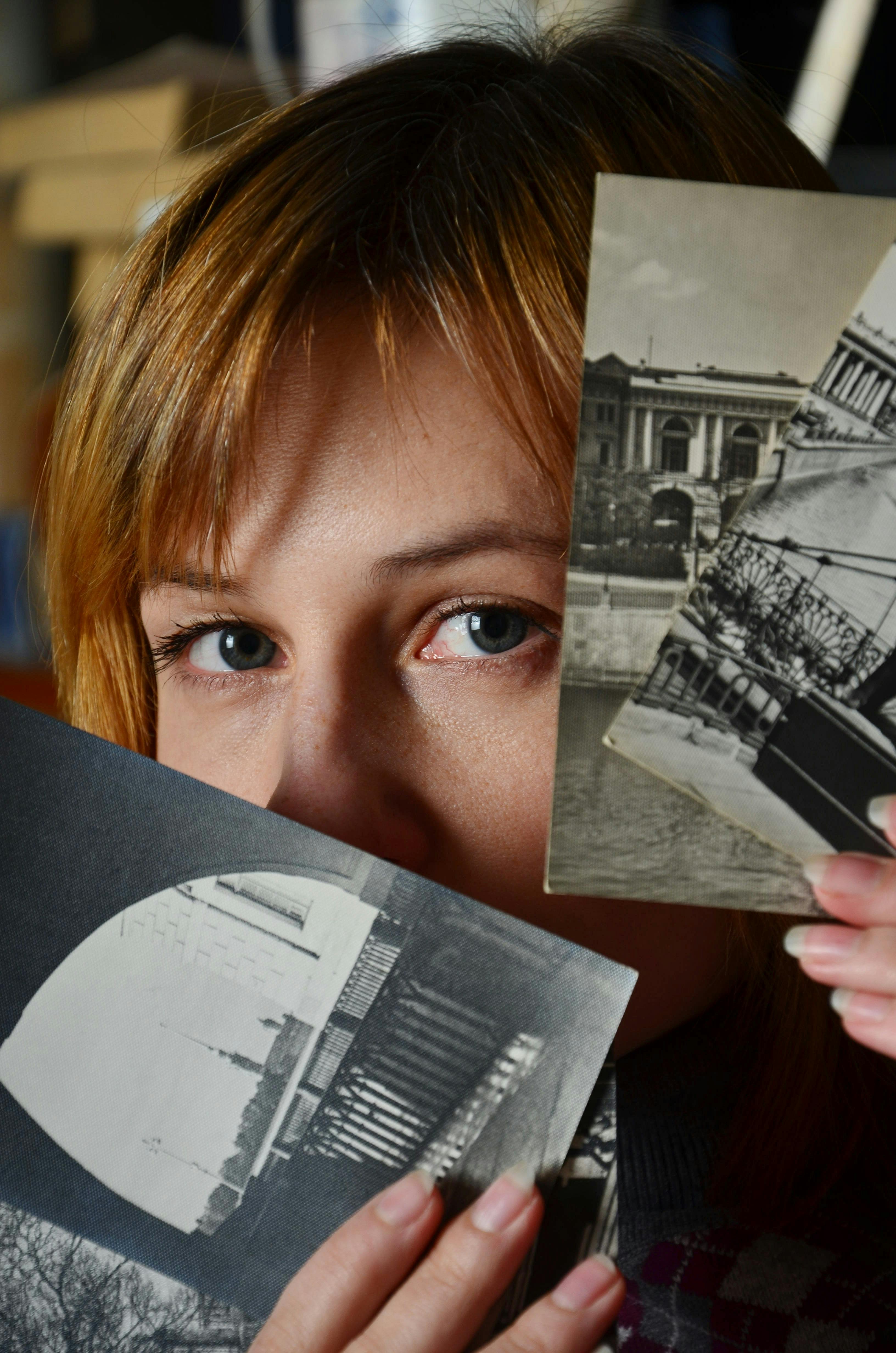 Assorted Photos on Table · Free Stock Photo