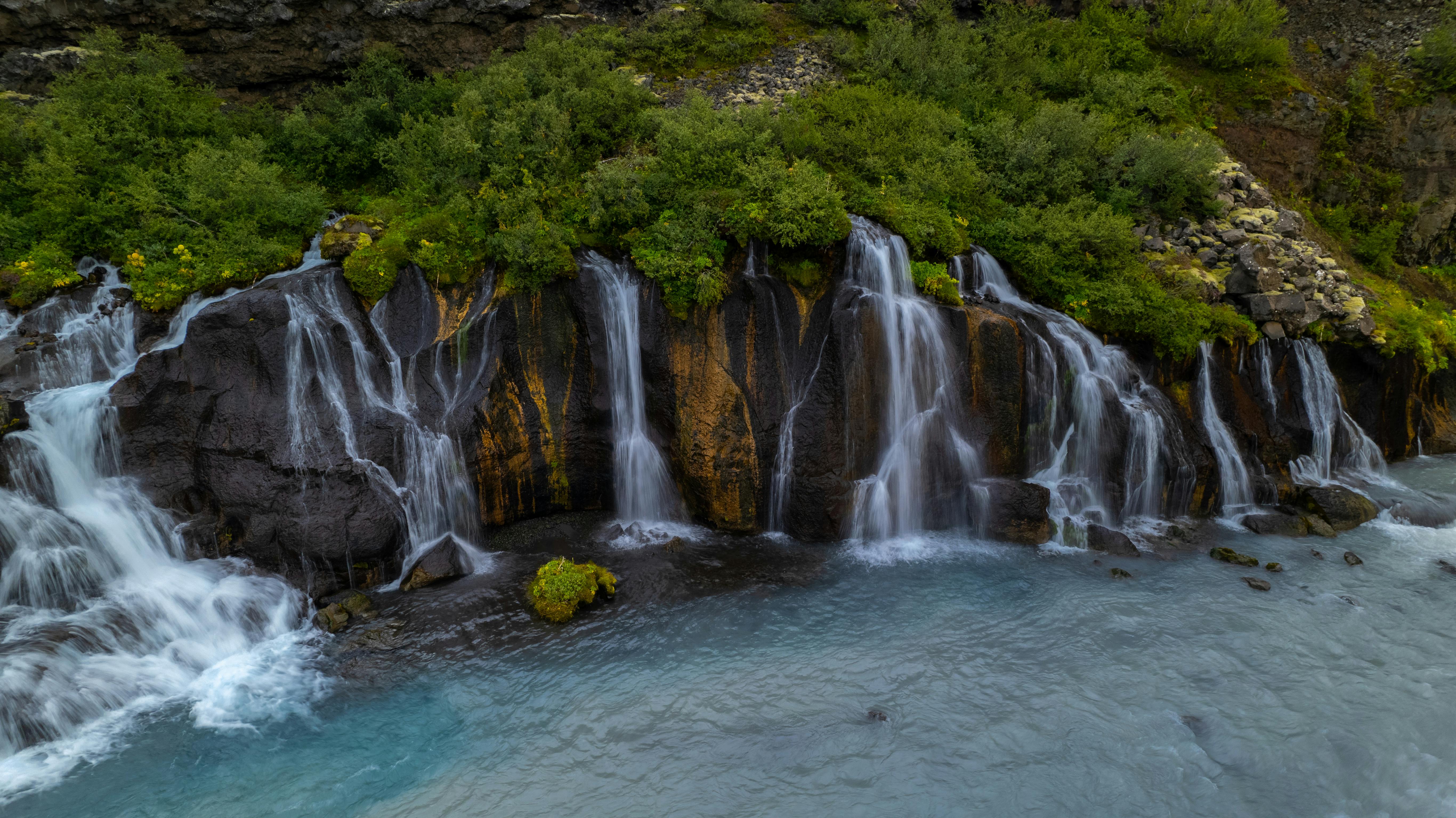 Series of Waterfalls in the Middle of Green Trees and Mountain · Free ...