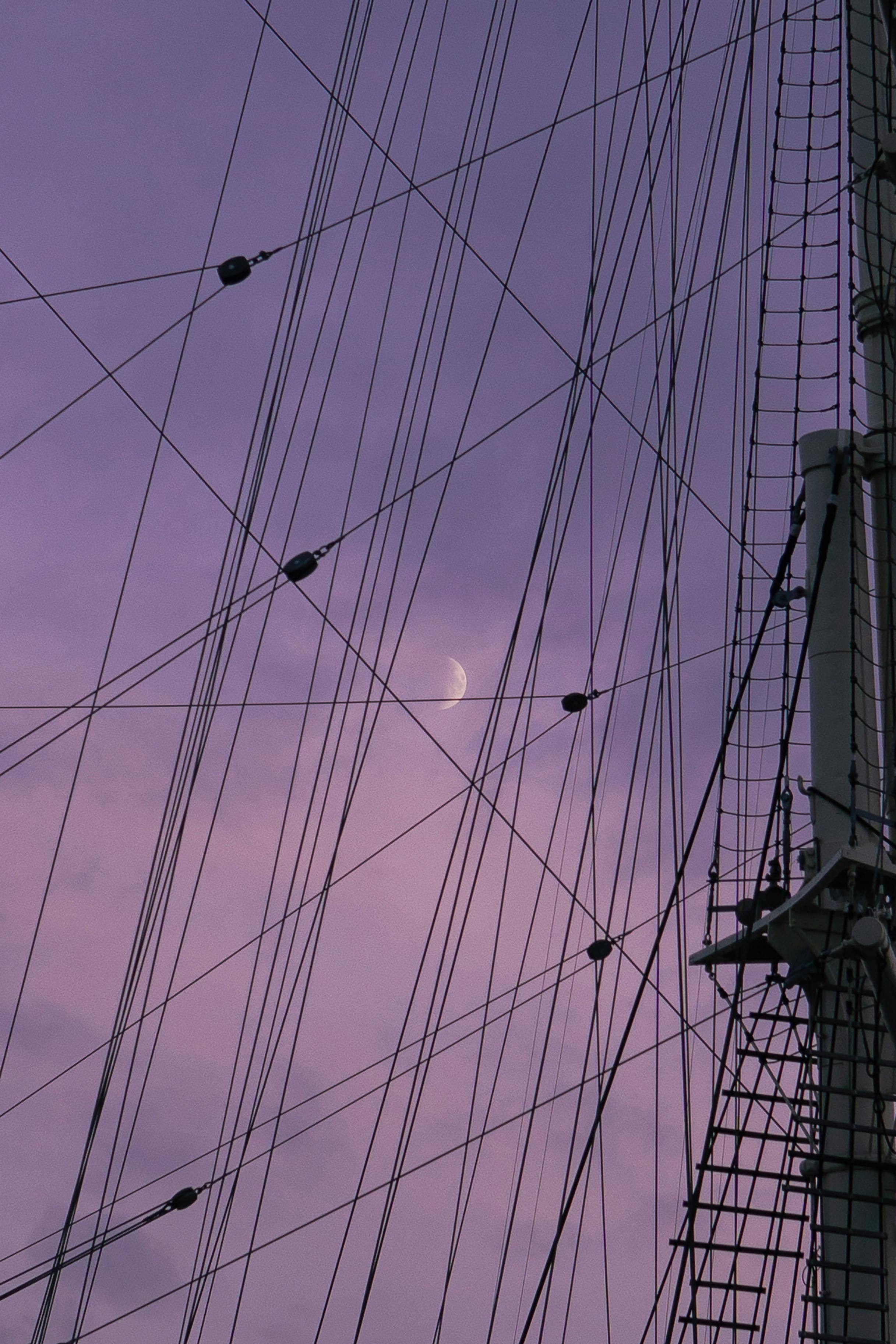 Crescent Moon behind Ropes · Free Stock Photo