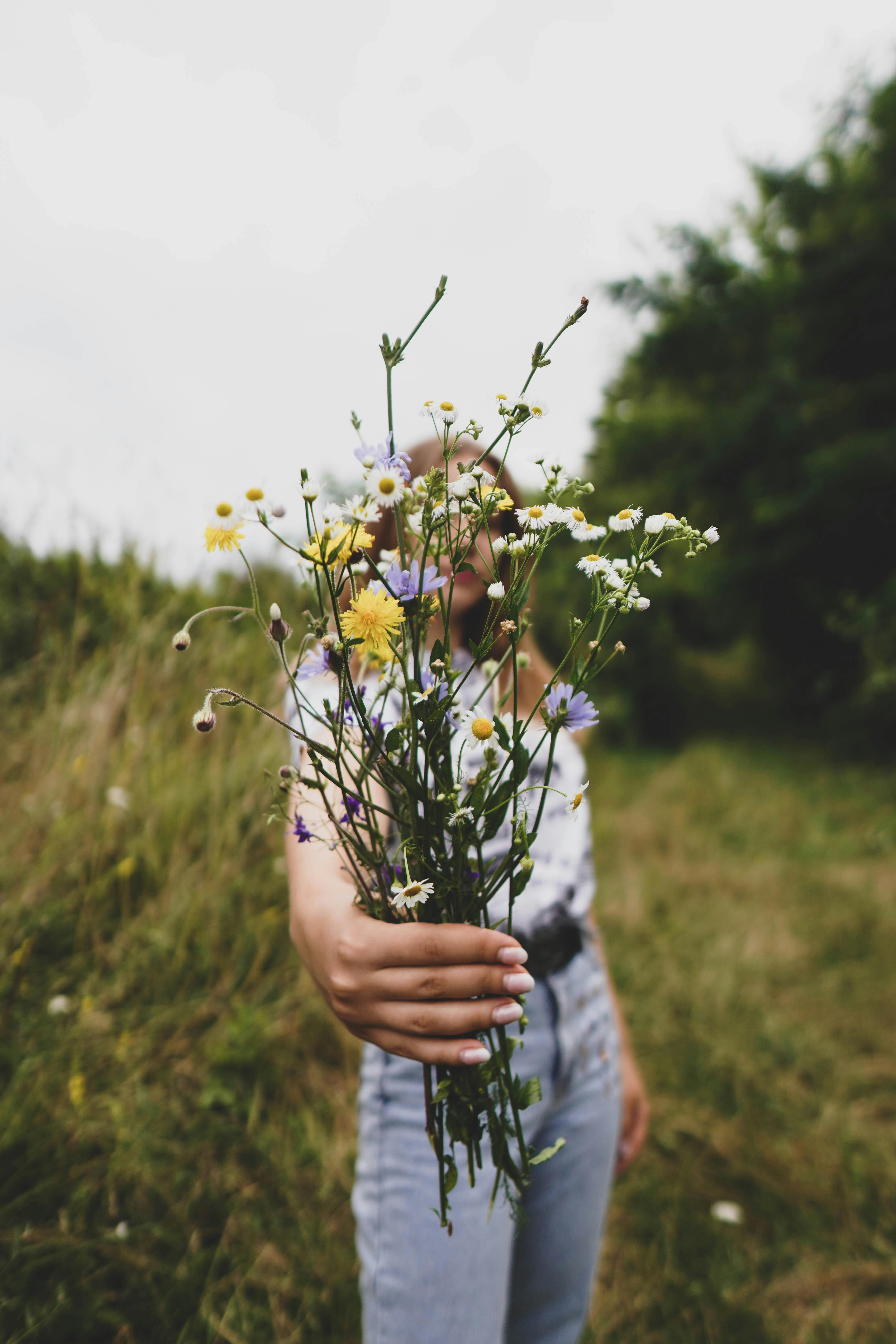 Flower Bouquet on Female Body · Free Stock Photo