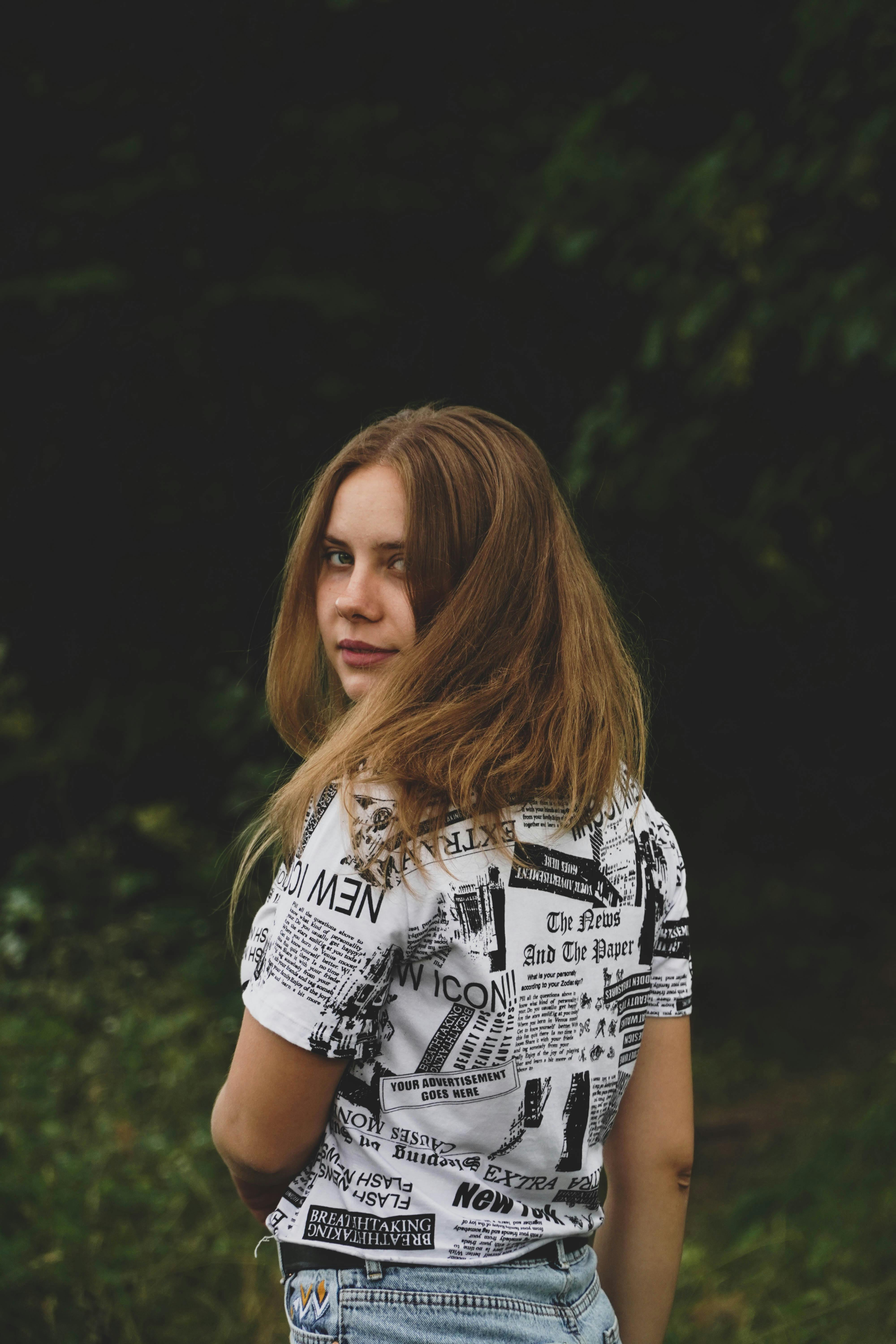 Beautiful Woman Looking Up · Free Stock Photo