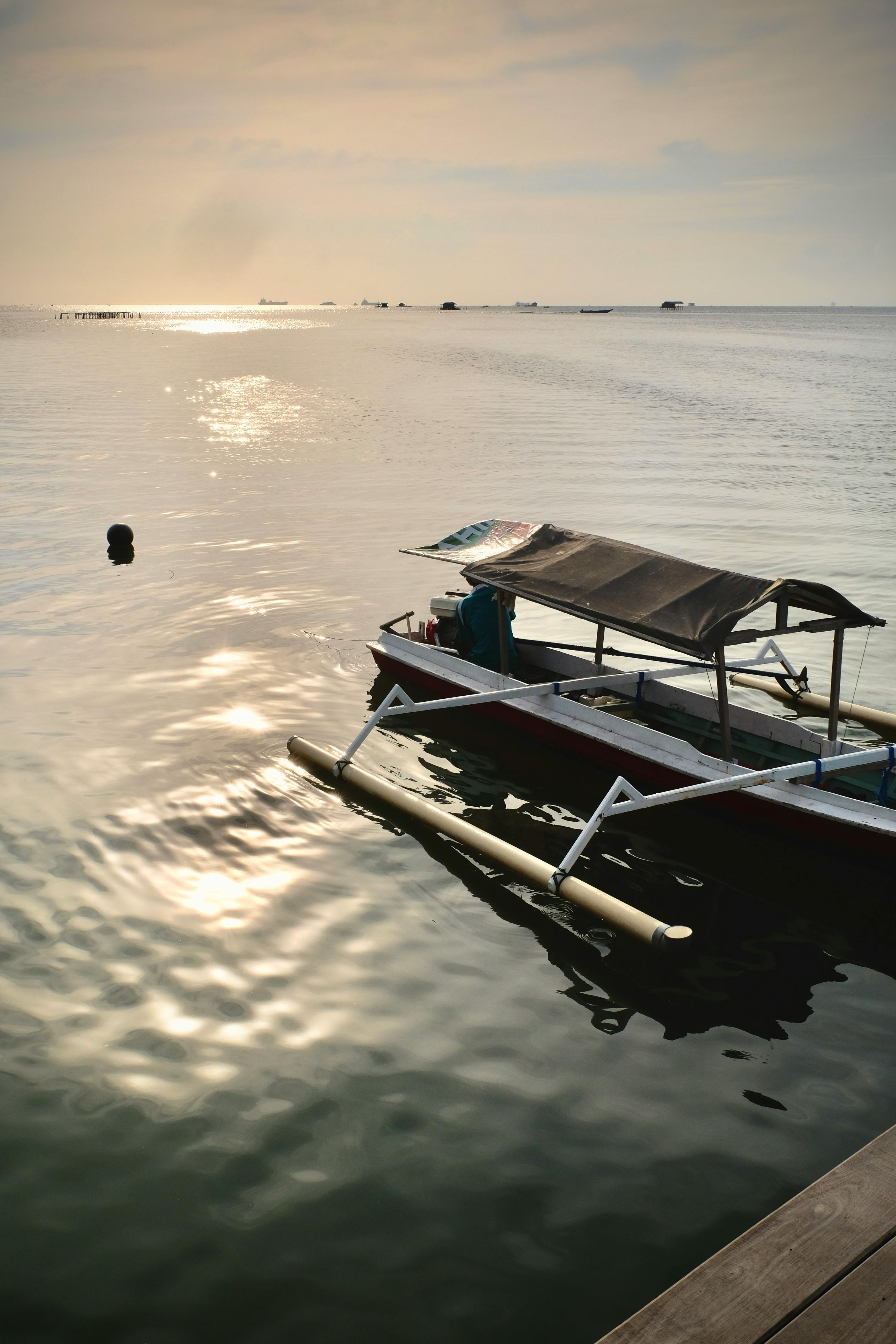 Traditional Filipino Boat in the Sea · Free Stock Photo