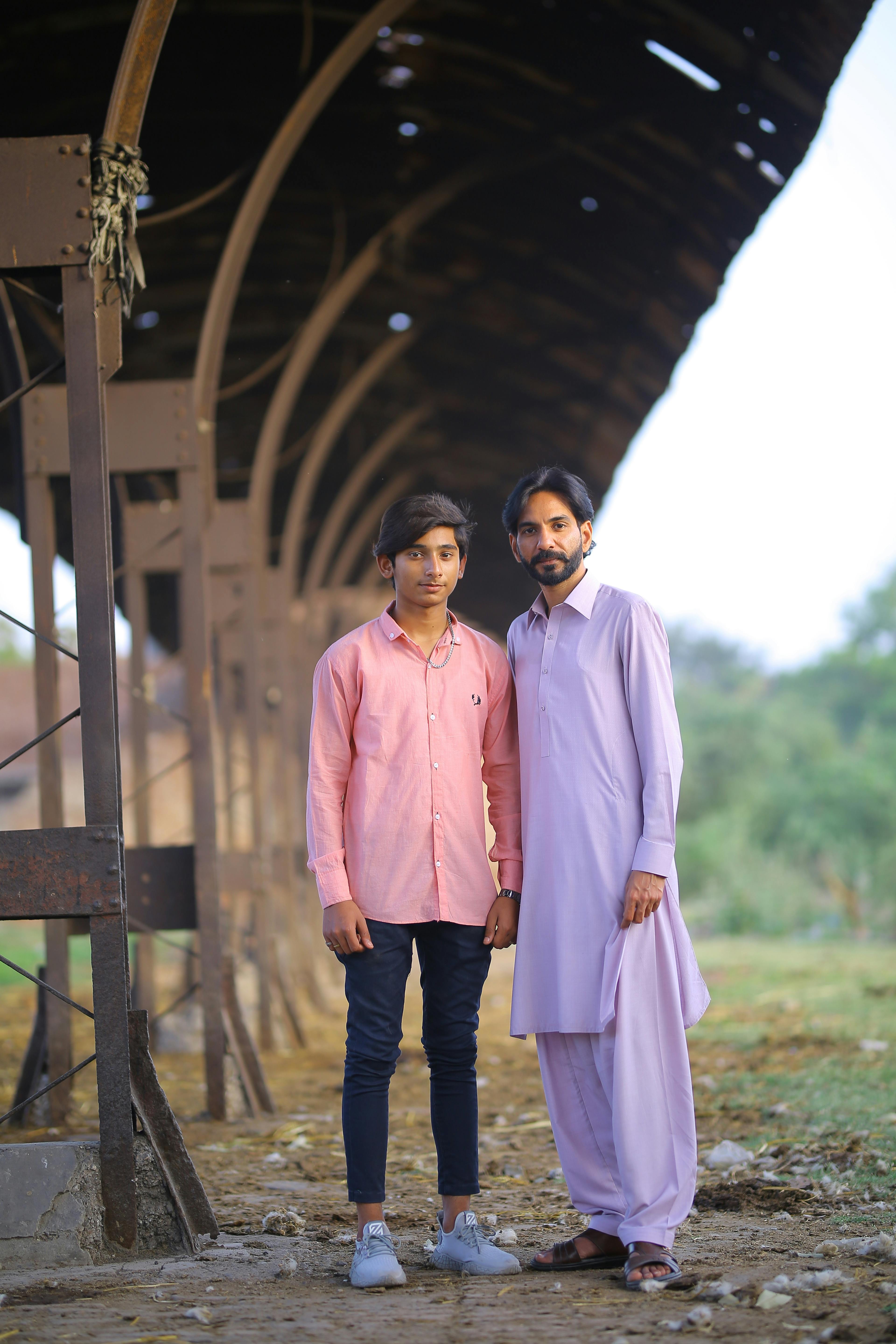 Father and Son Flying a Kite · Free Stock Photo