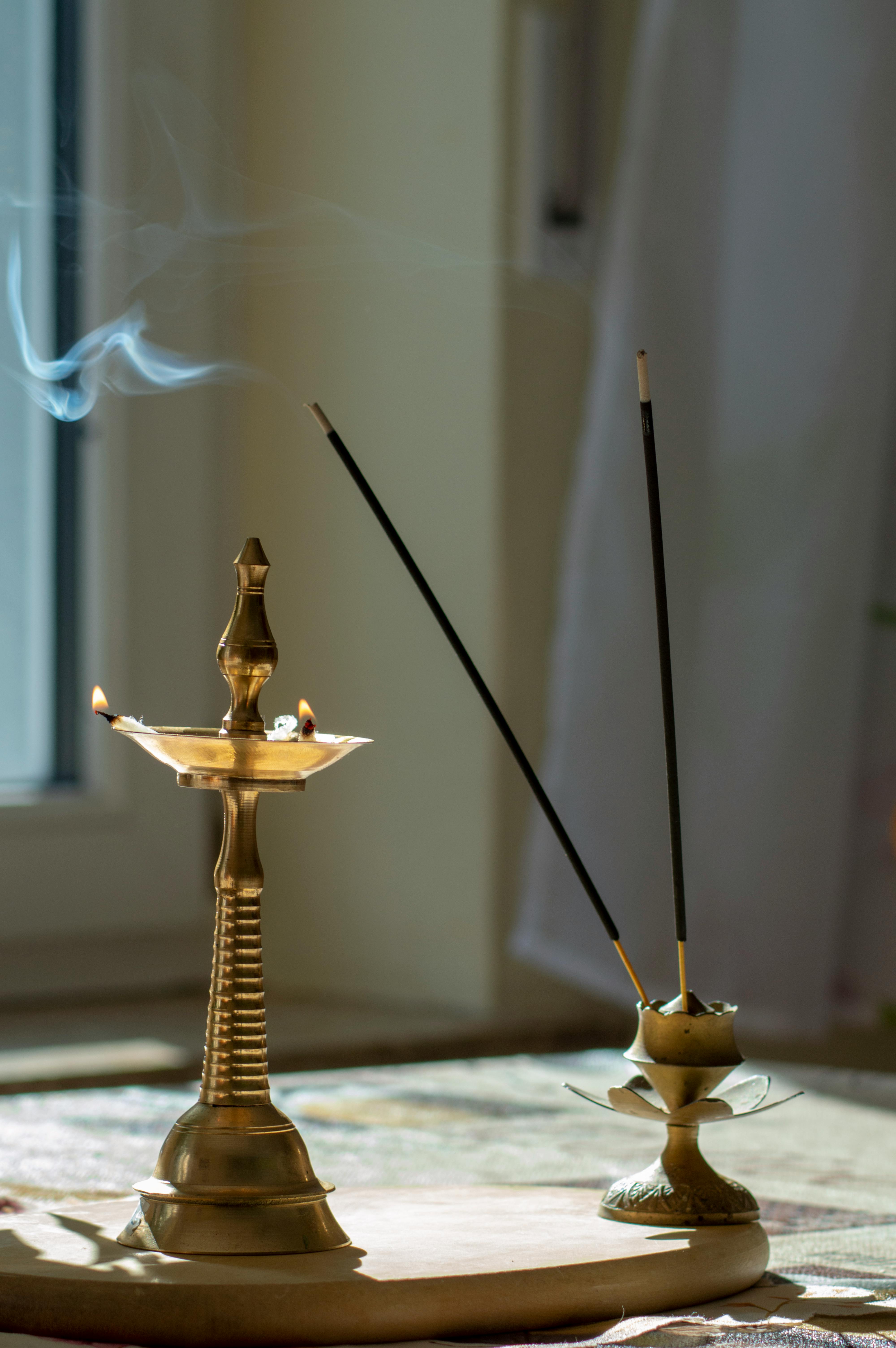 Scent fume of burning incense stick against black background · Free ...