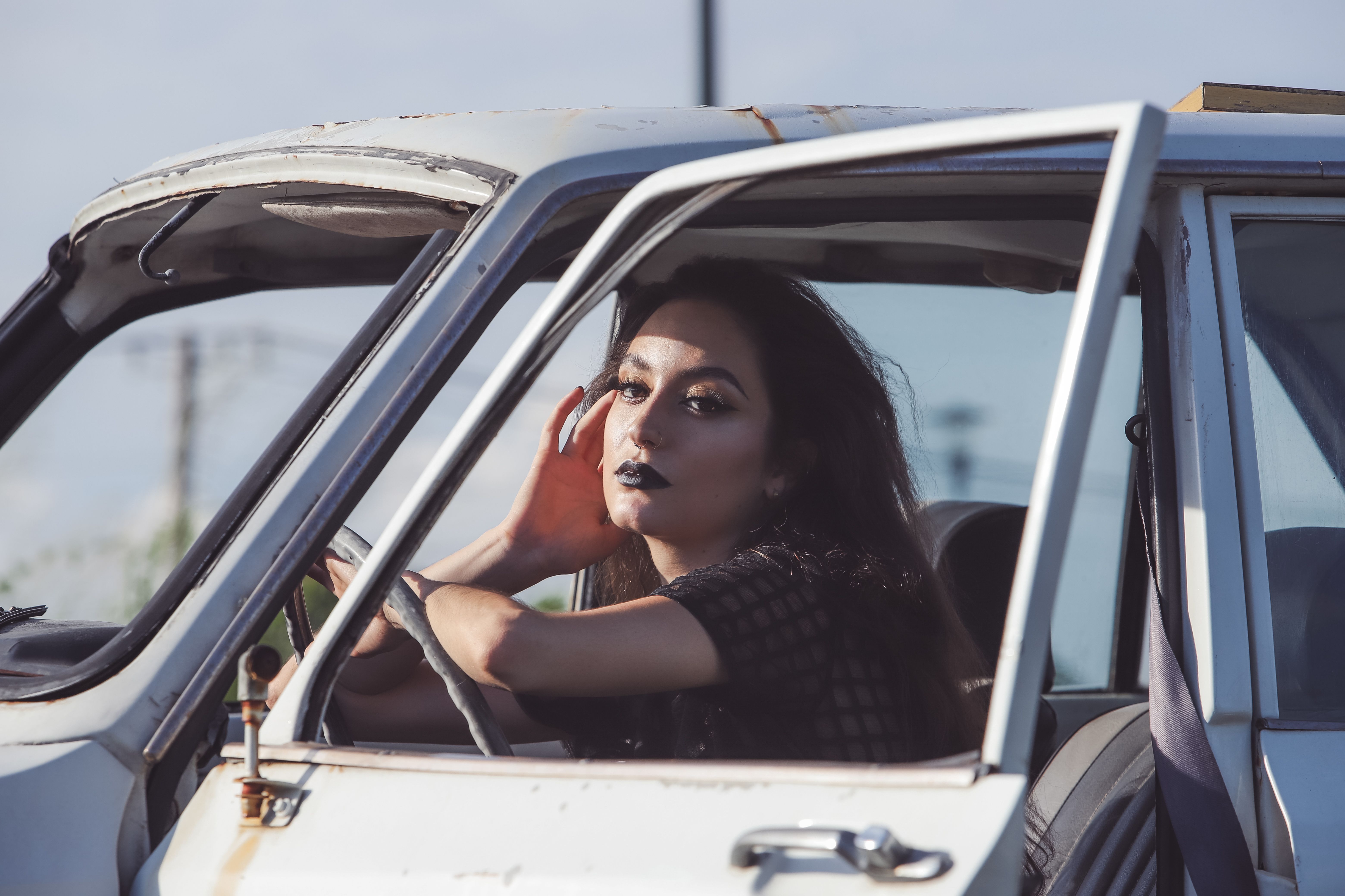 A Woman Sitting Inside a Car · Free Stock Photo