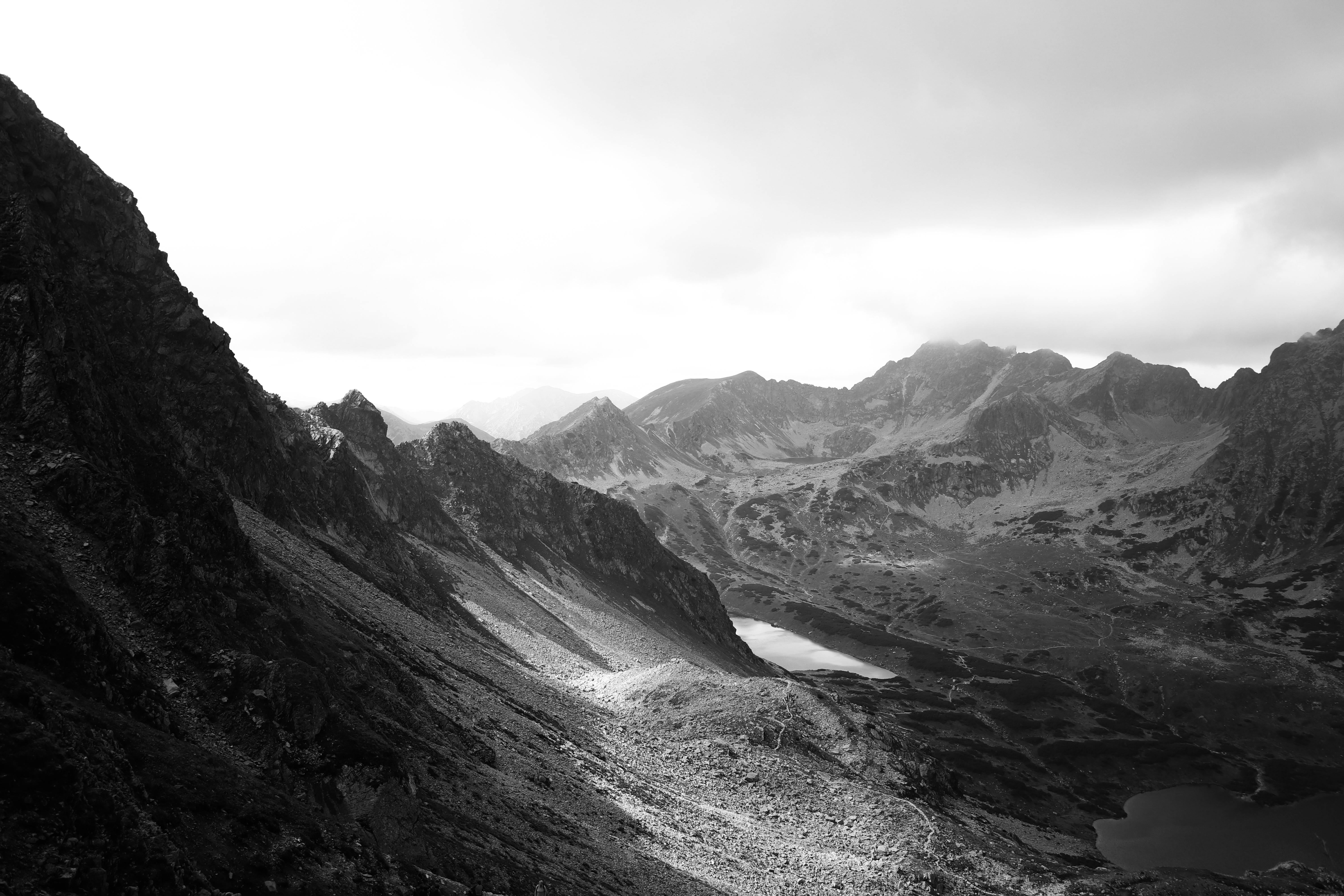 Grayscale Photo of Cable Cars · Free Stock Photo