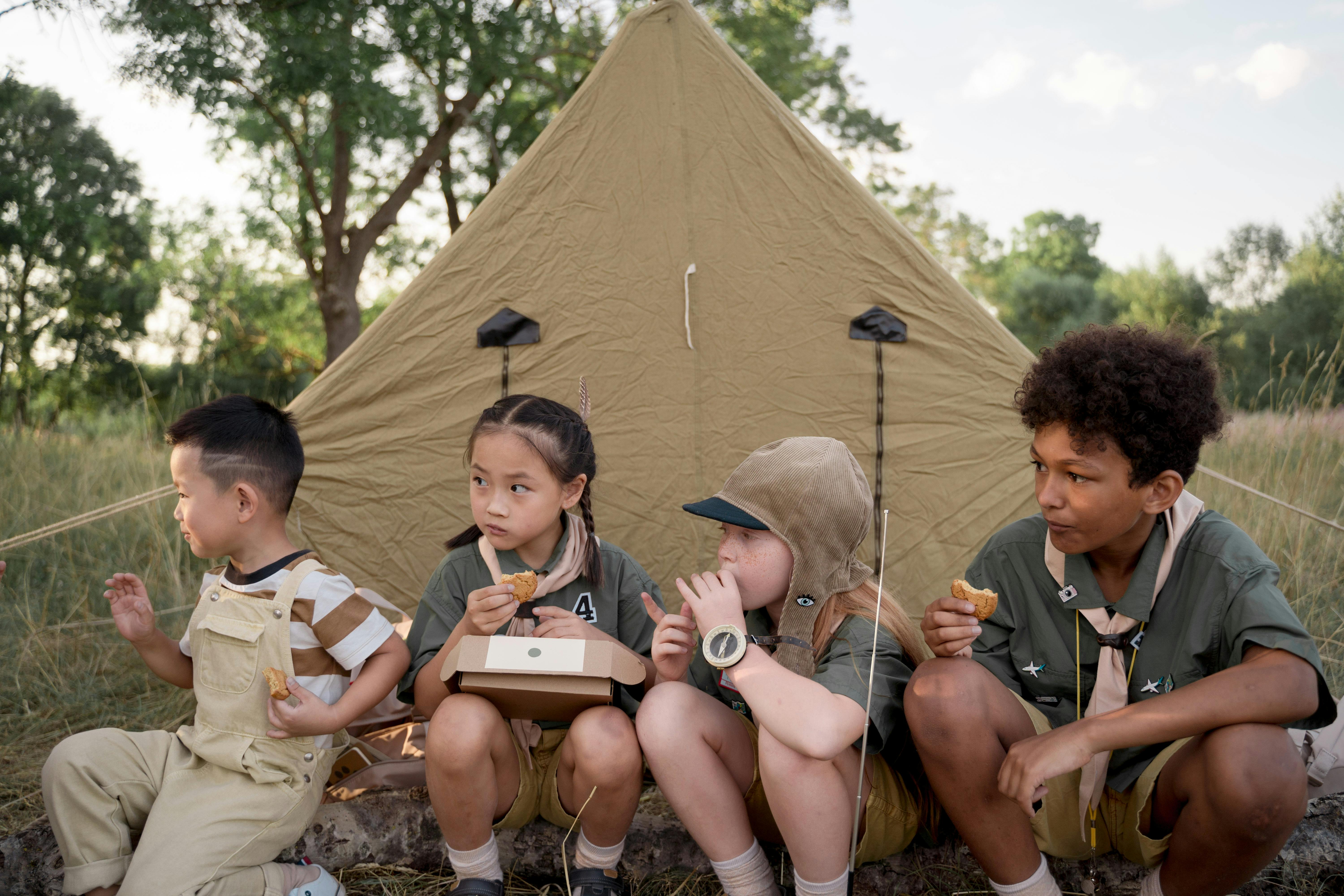 Scouts Eating by Tent · Free Stock Photo