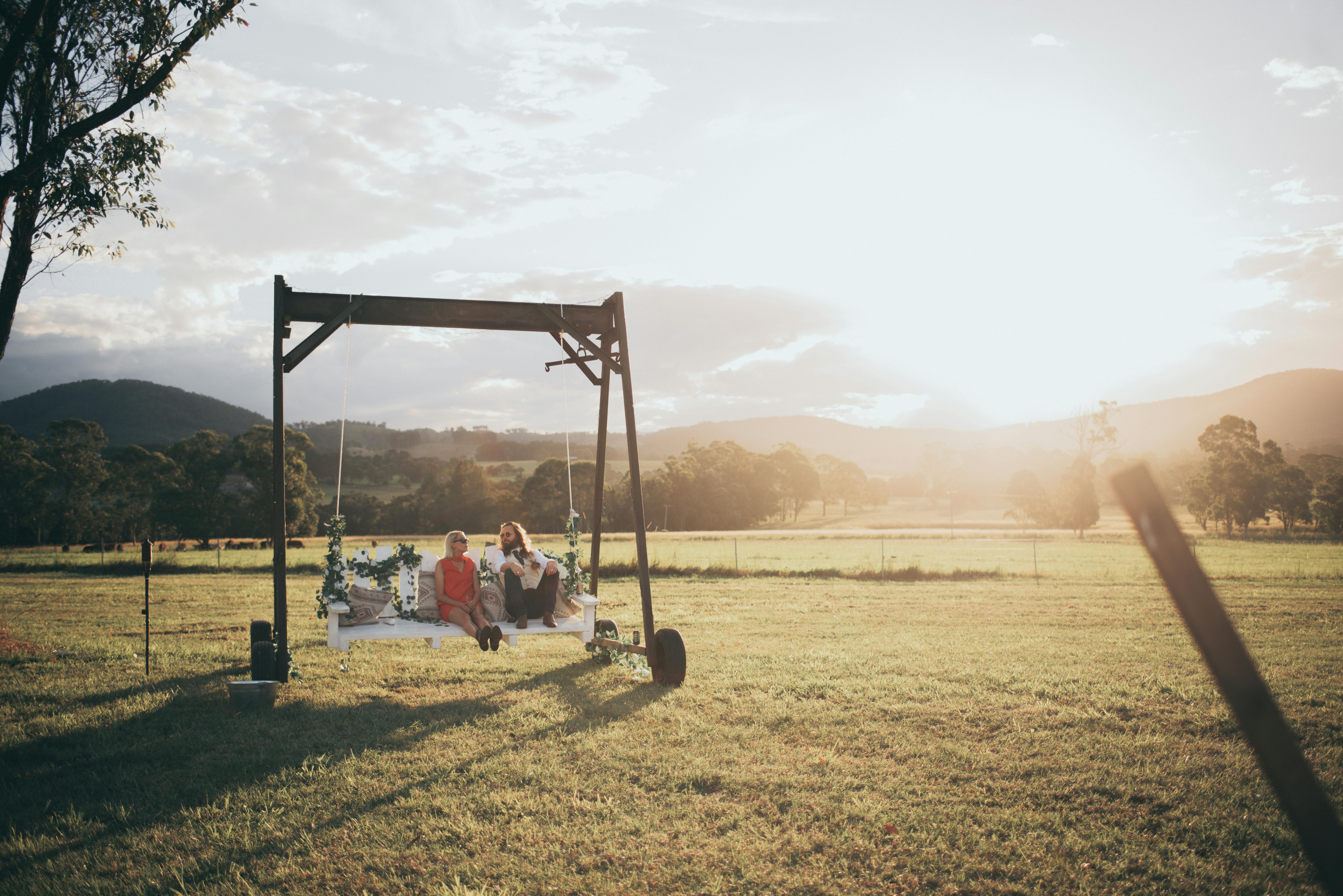 A Couple on a Swing · Free Stock Photo