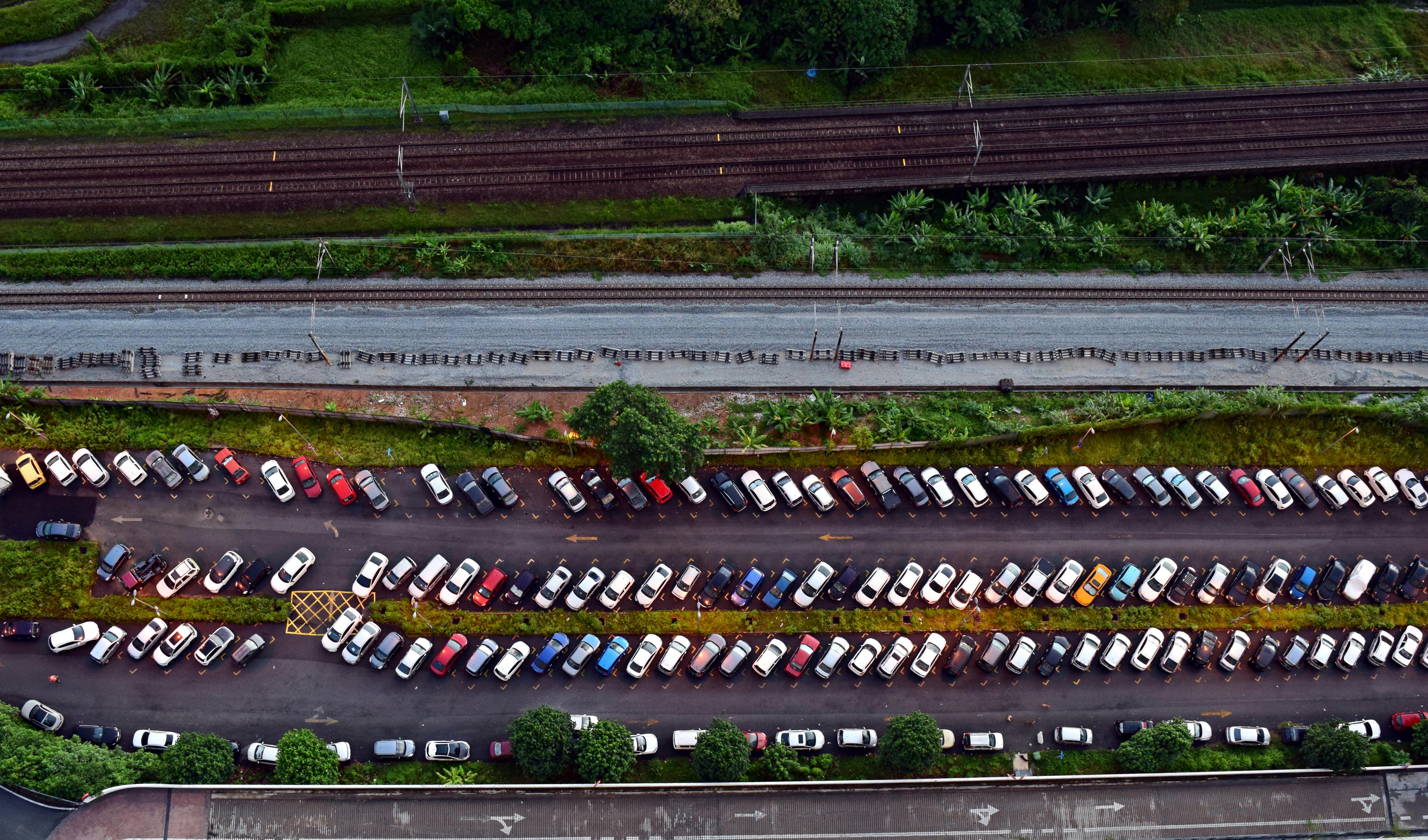 Aerial Photography of Cars Parked on the Road · Free Stock Photo