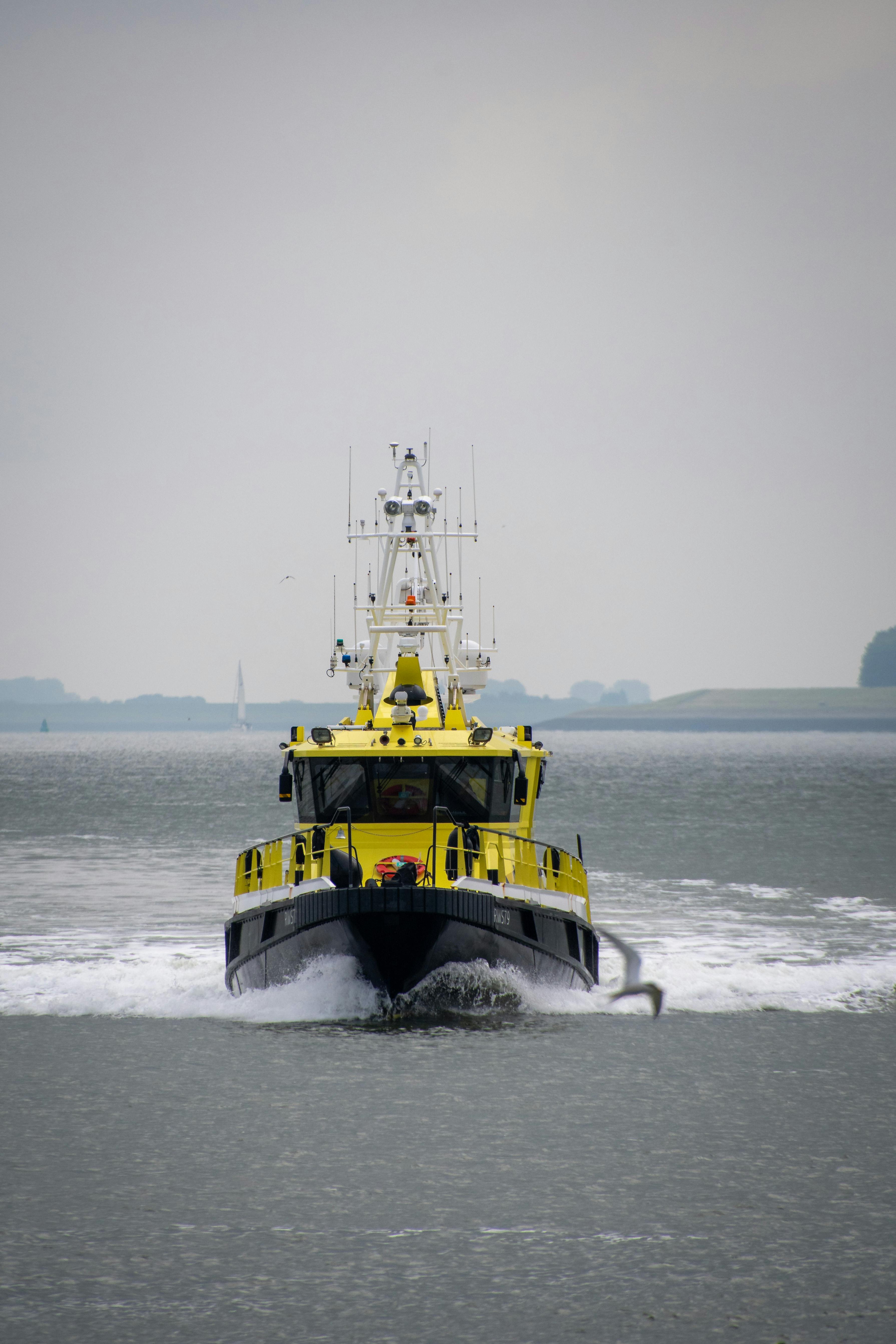 White and Yellow Ship on Sea · Free Stock Photo