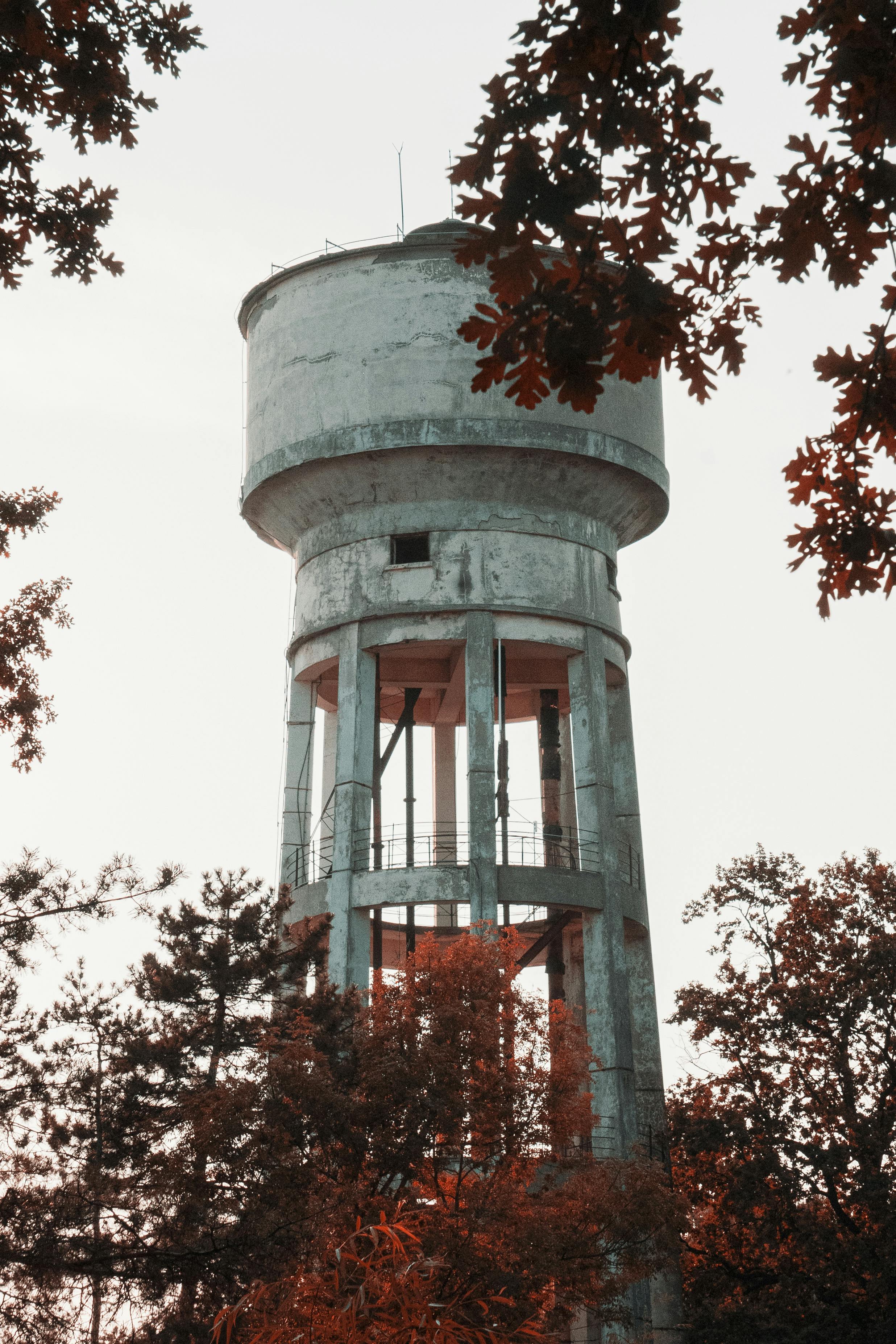 Rusty Water Tank Under Blue Sky · Free Stock Photo
