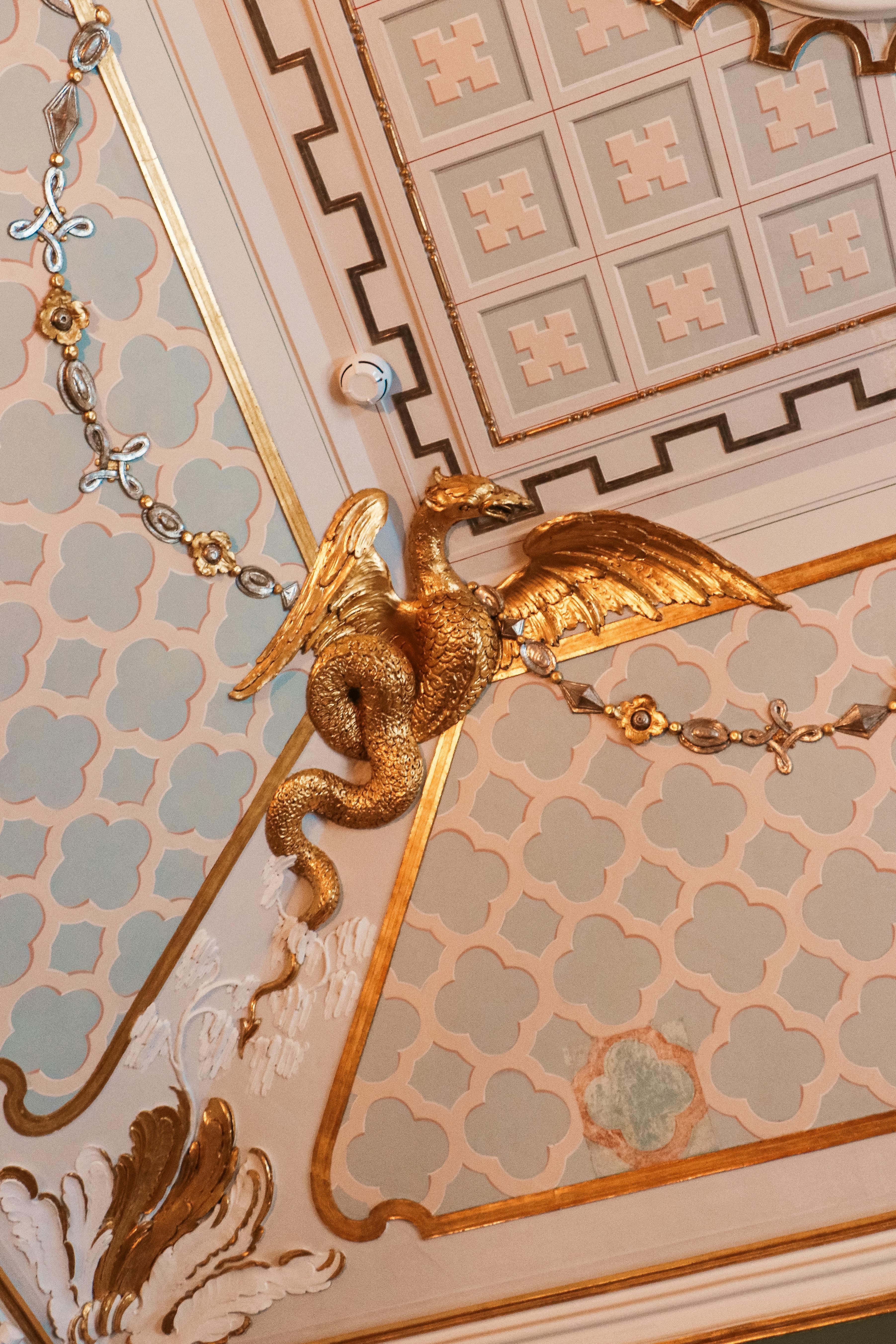 Gold Dragon on White Ceiling with Intricate Designs · Free Stock Photo