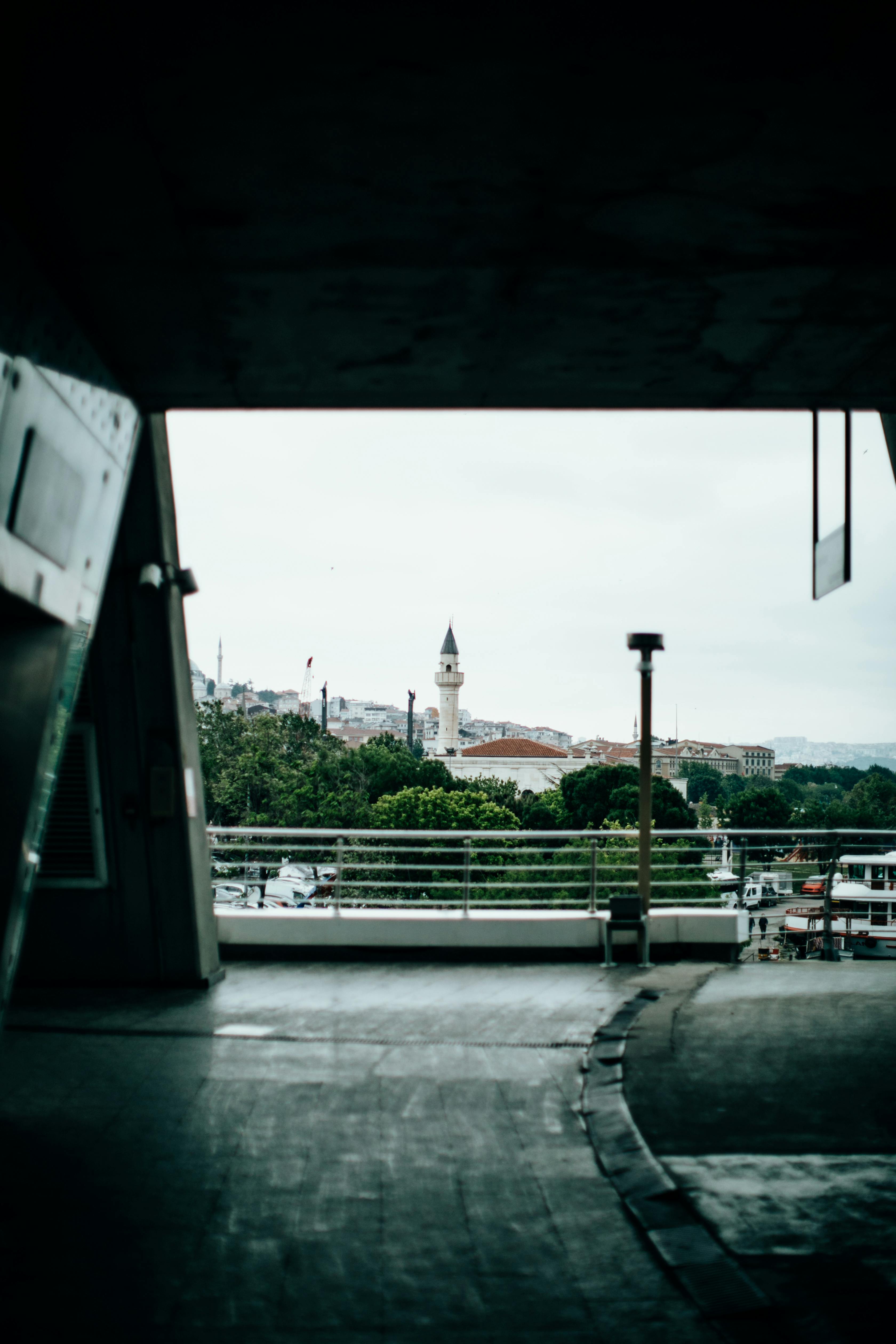Man in Under Bridge Passage · Free Stock Photo